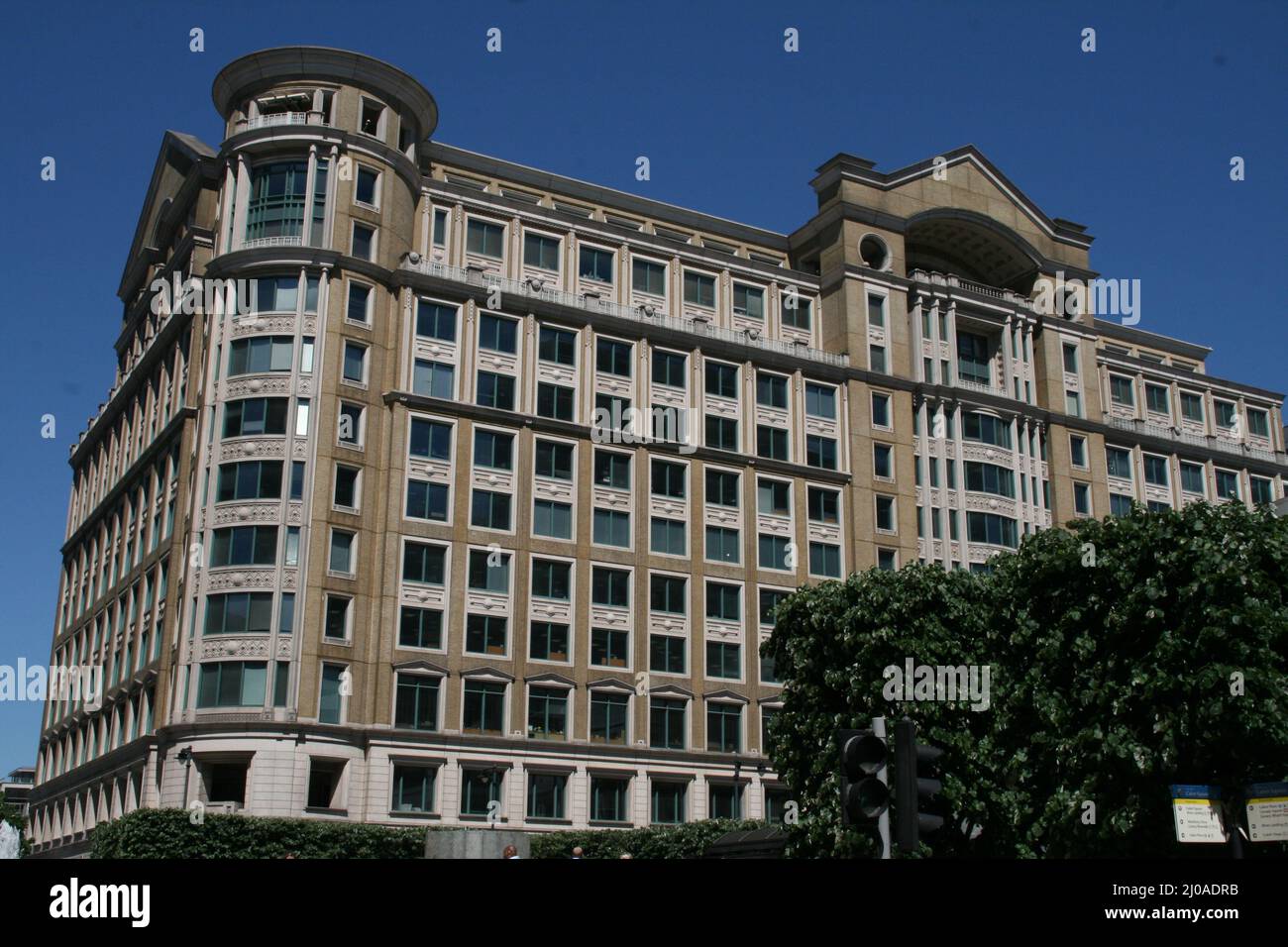 Modern mid-rise building with glass windows in London Stock Photo - Alamy