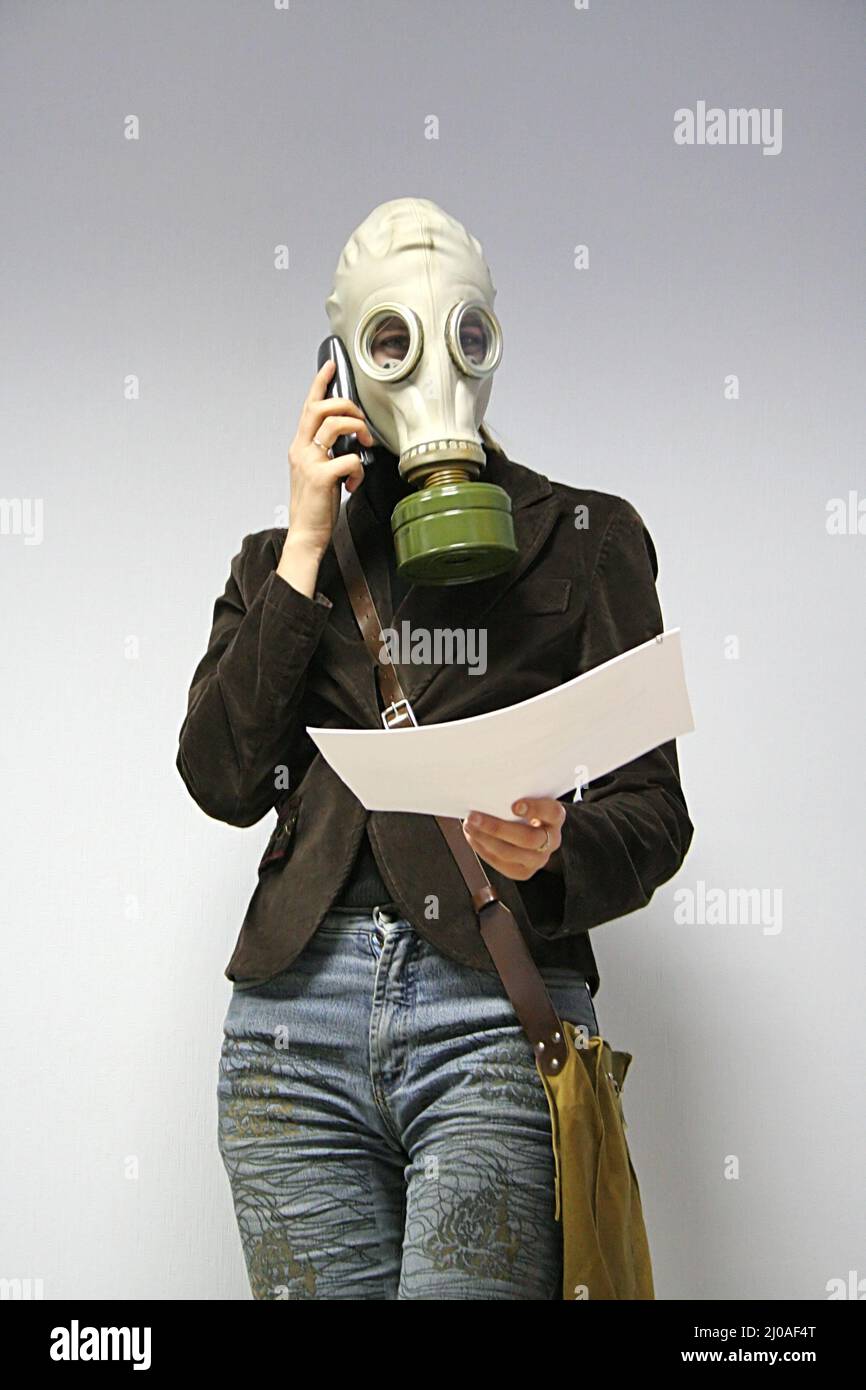 Woman in a gas mask Stock Photo - Alamy
