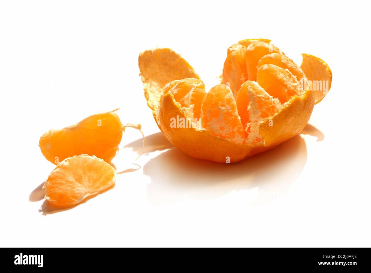 Eat mandarin Cut Out Stock Images & Pictures - Alamy