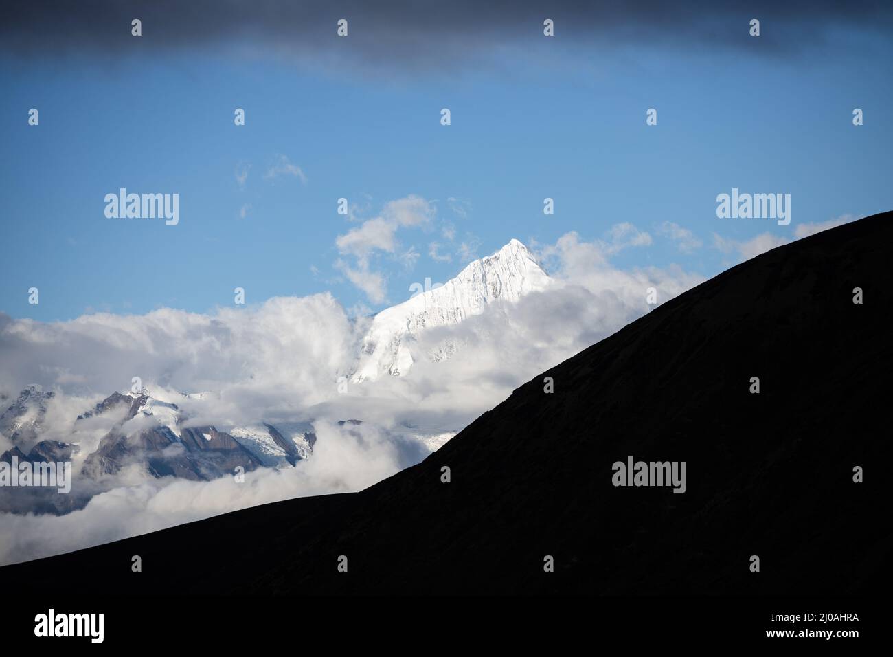 Snow capped Meili mountain in Yunnan province Stock Photo - Alamy