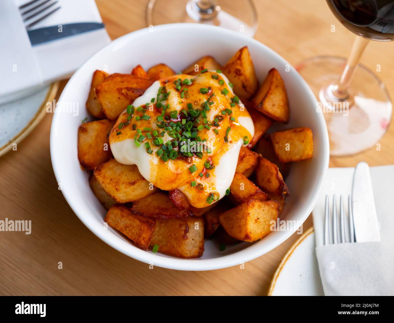 Spanish fried potatoes patatas bravas Stock Photo - Alamy