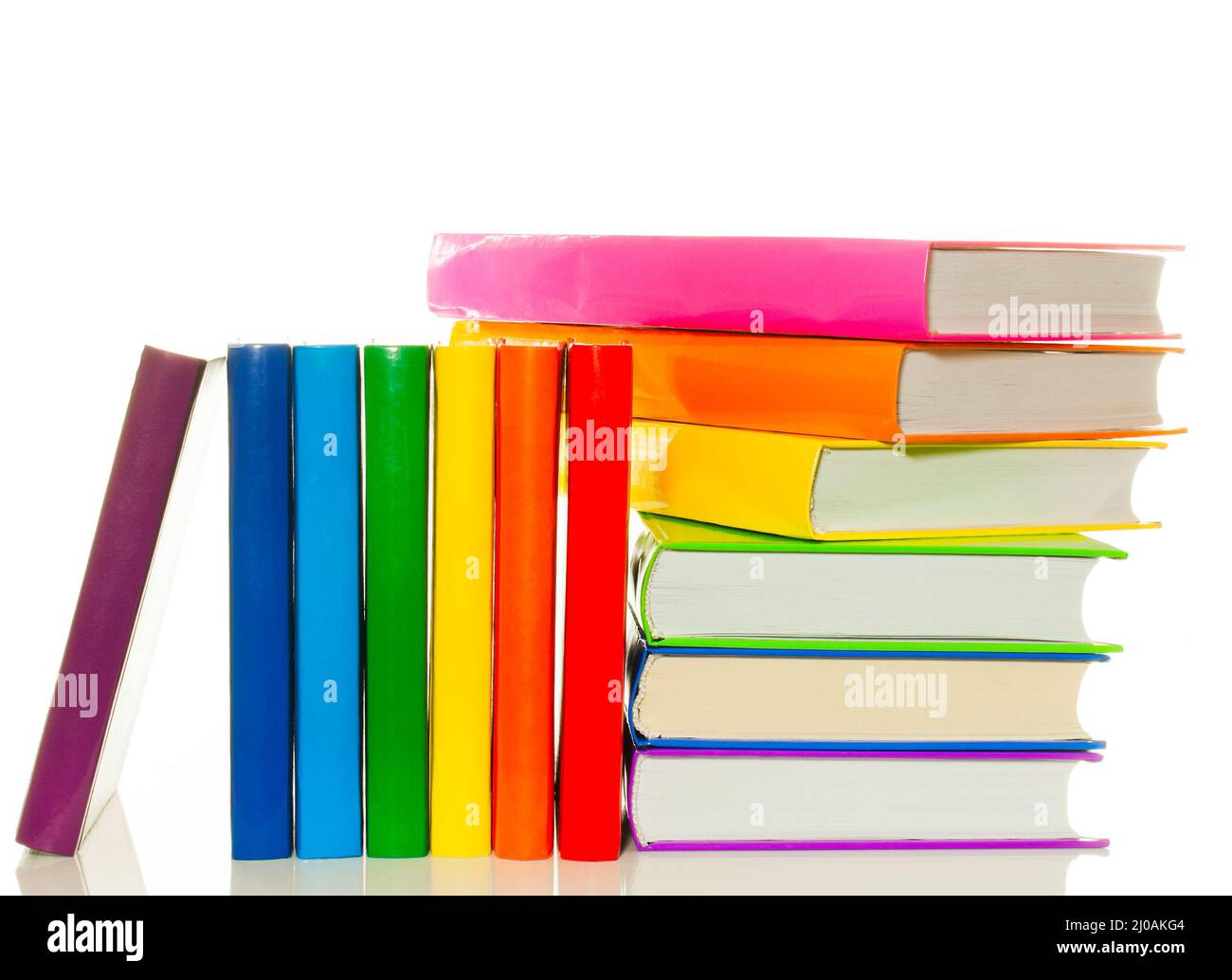 Heap of colorful books over white background Stock Photo - Alamy