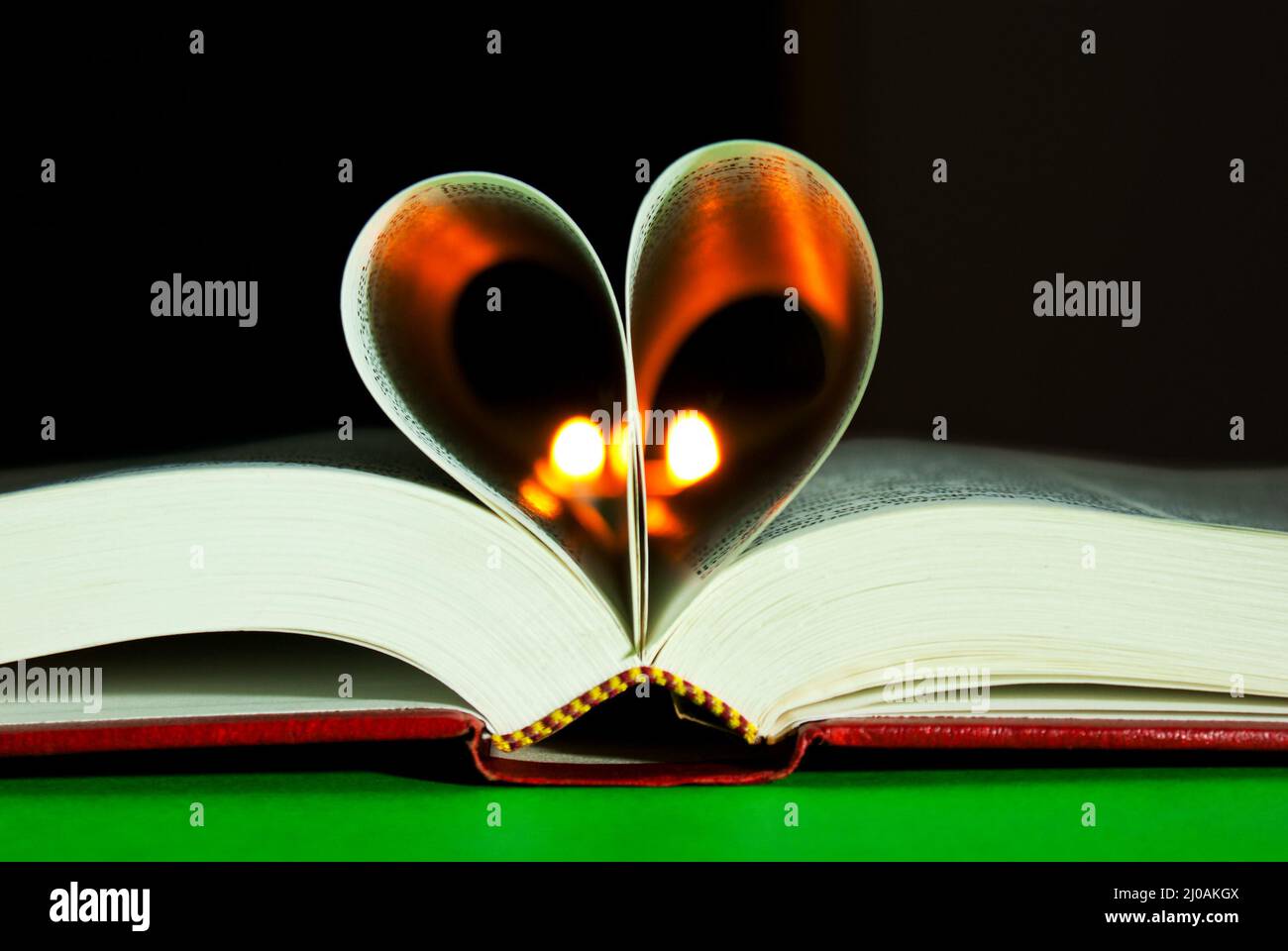 Open book laying on the table Stock Photo - Alamy