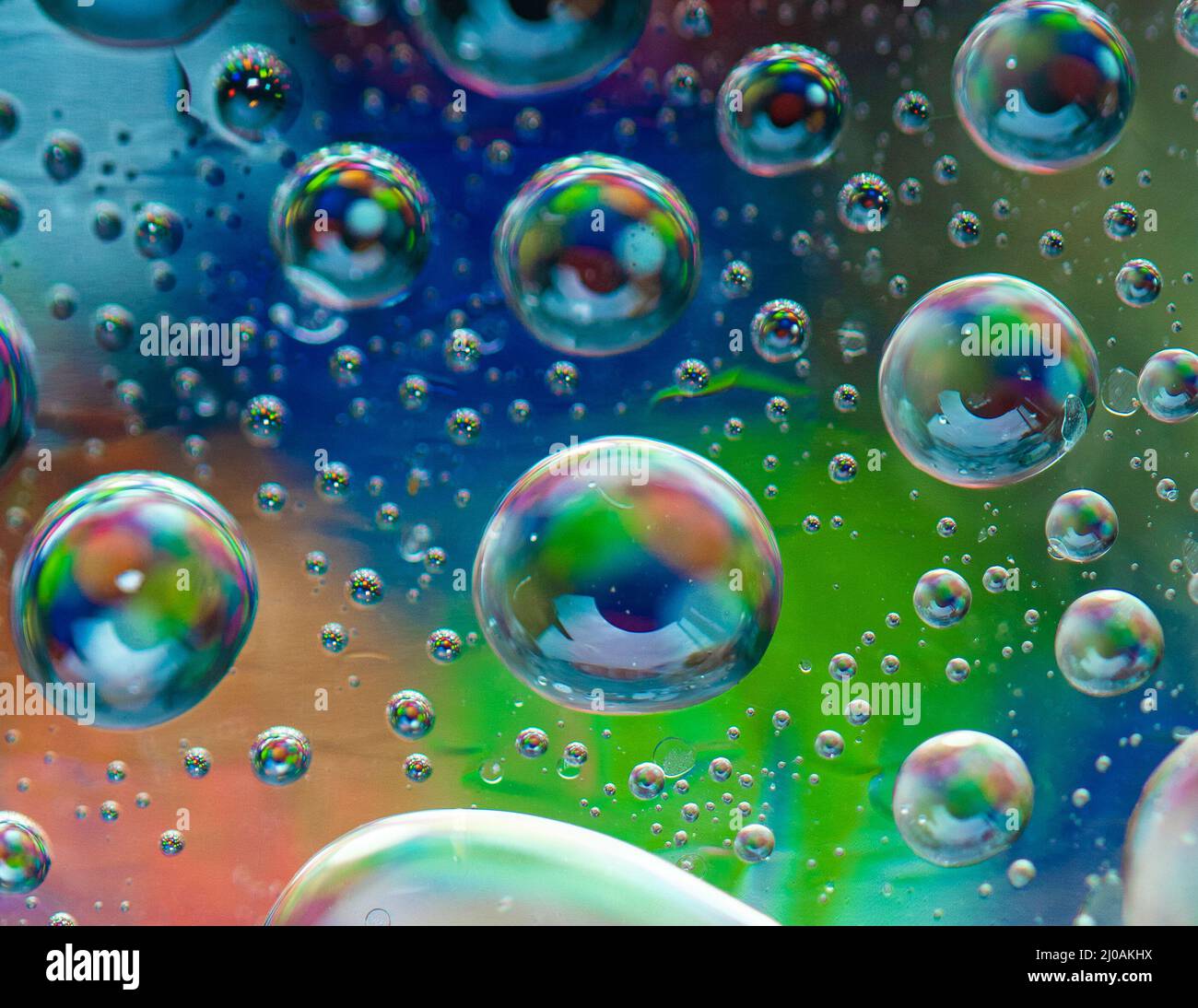 Colorful water bubbles creating an abstract background Stock Photo - Alamy