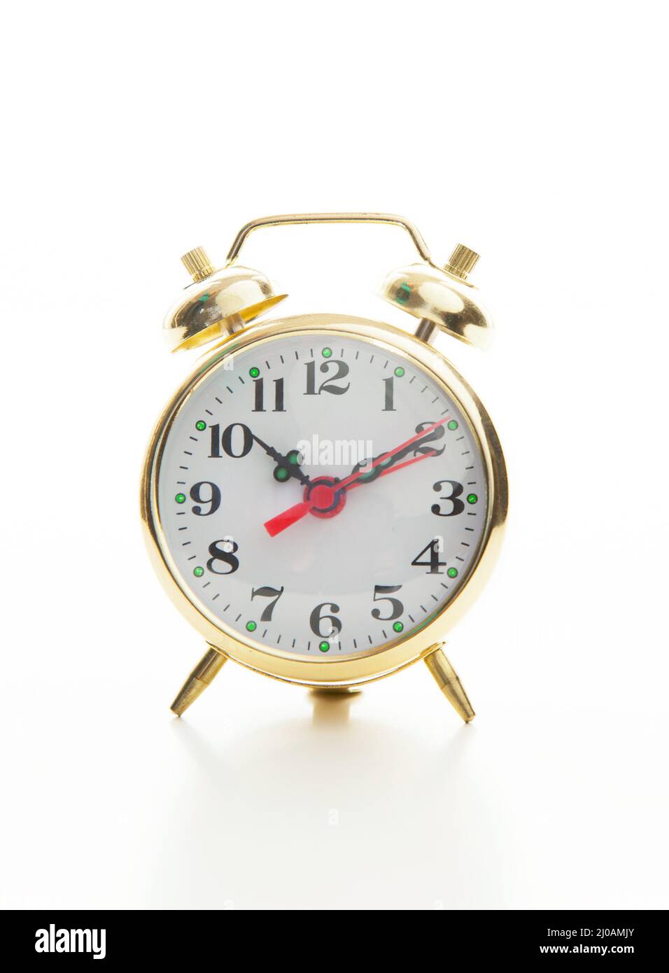 Golden retro style alarm clock Stock Photo - Alamy