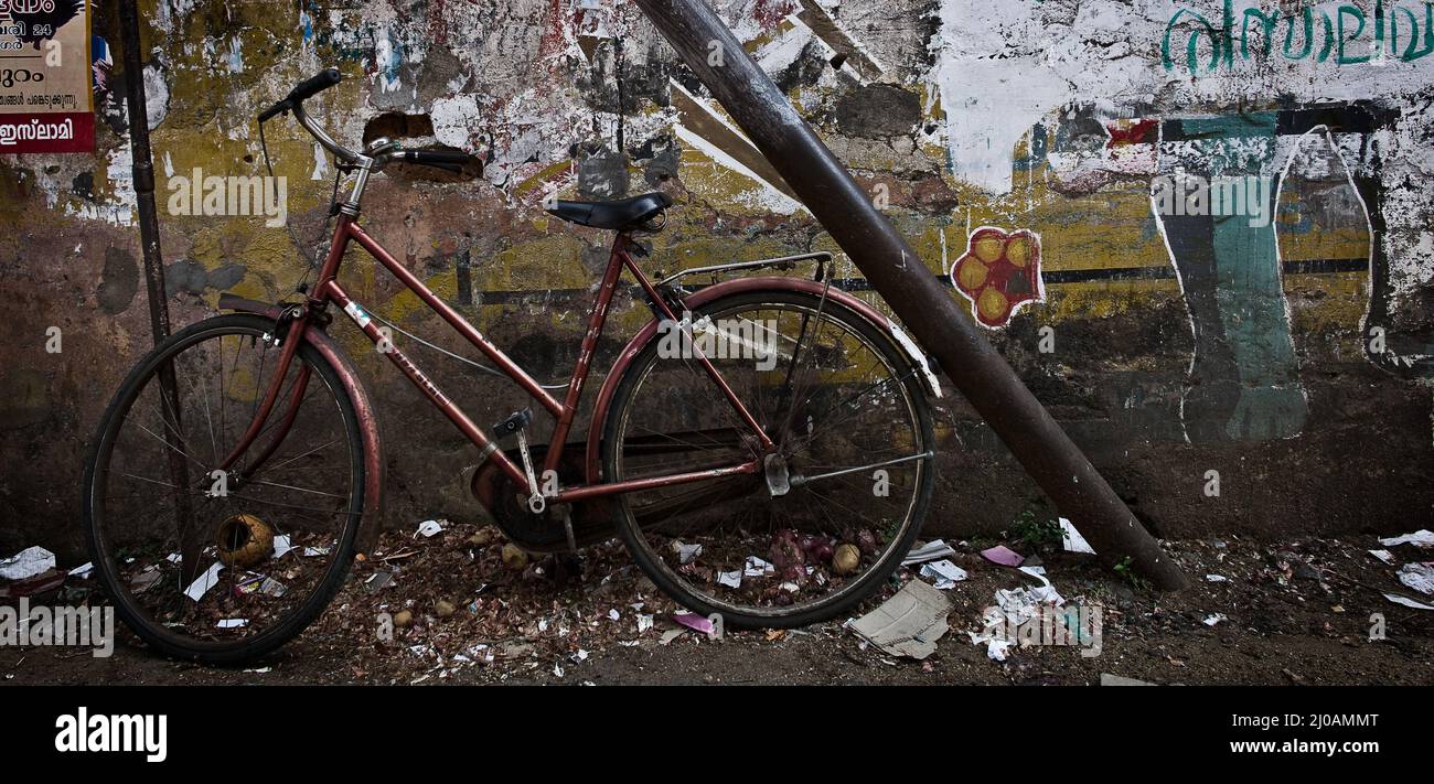 Bike on wall Stock Photo - Alamy