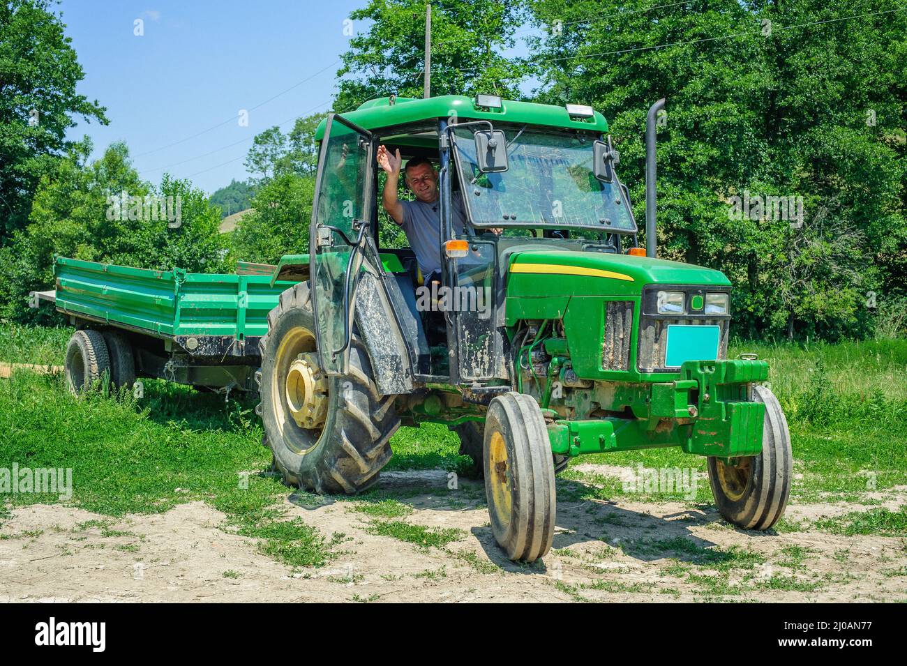 Portrait worker driving tractor hi-res stock photography and images - Alamy