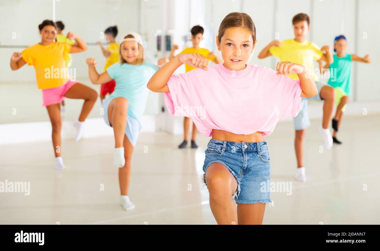 Dance studio - girls and boys in dance lesson Stock Photo - Alamy