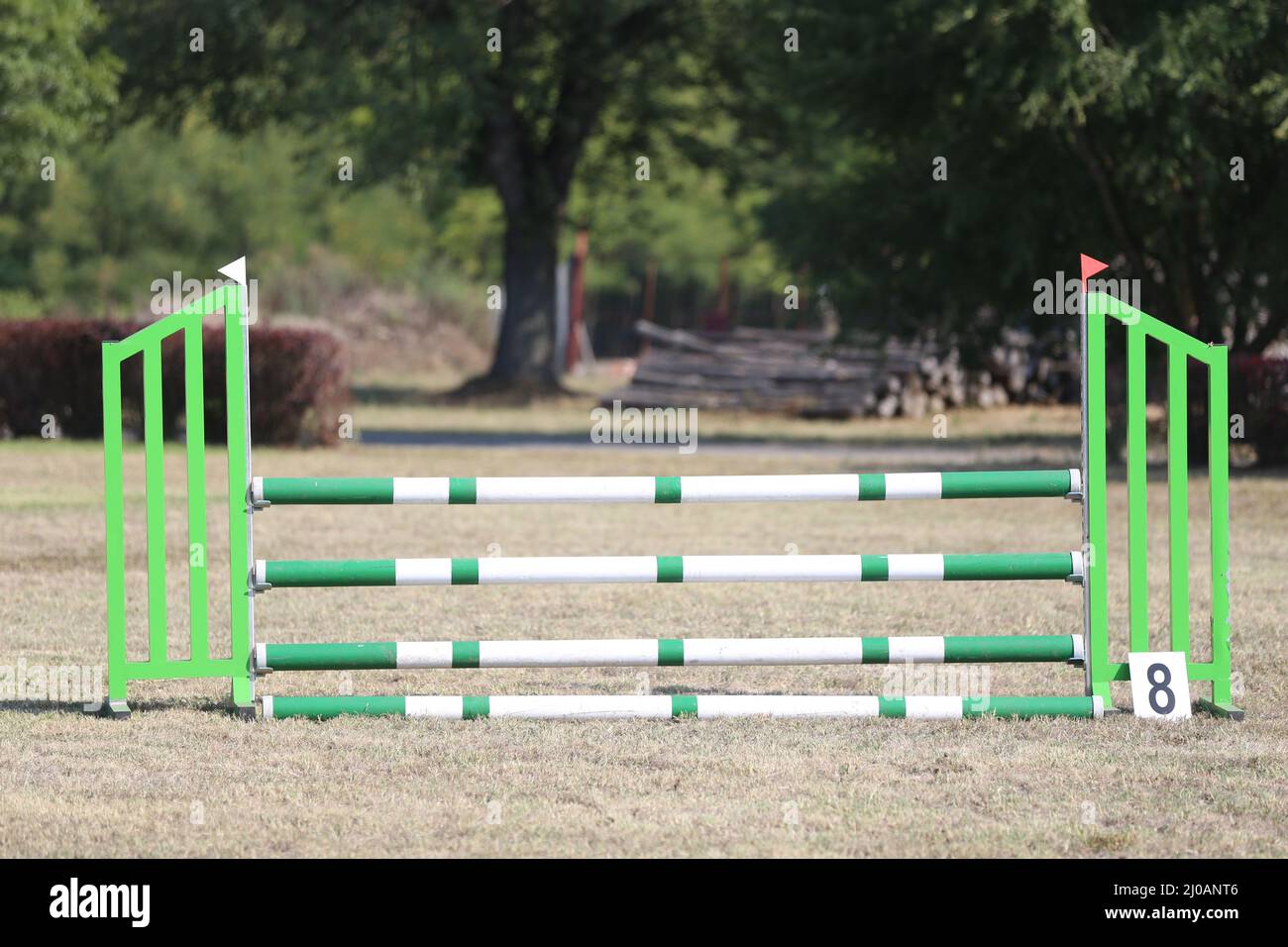 Show jumping poles obstacles, barriers, waiting for riders on show ...