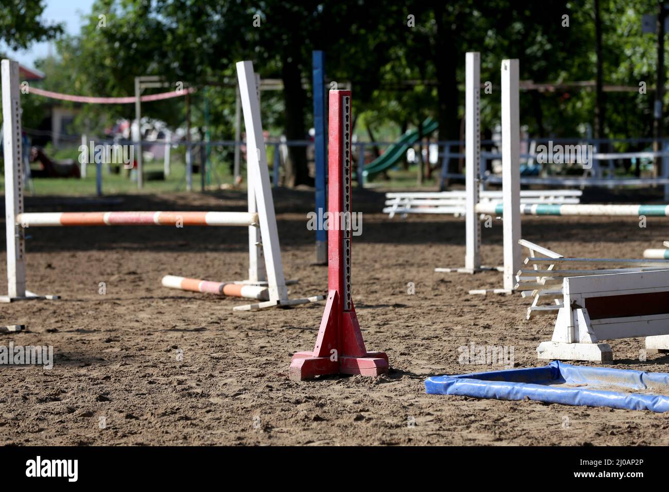 Show jumping poles obstacles, barriers, waiting for riders on show ...