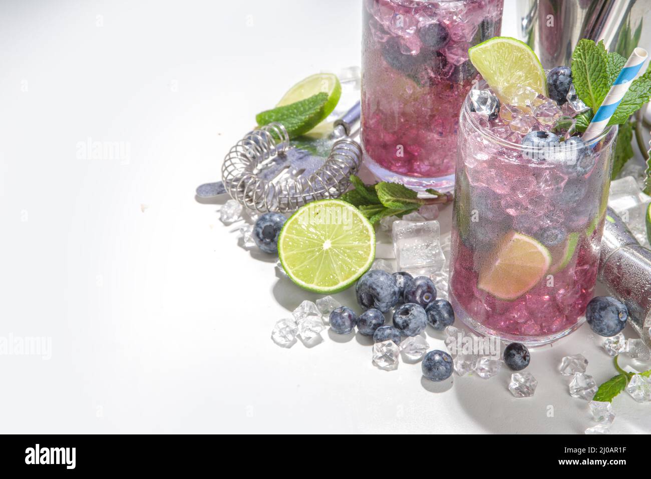 Blueberry citrus summer cooling drink, iced berry mojito lemonade ...
