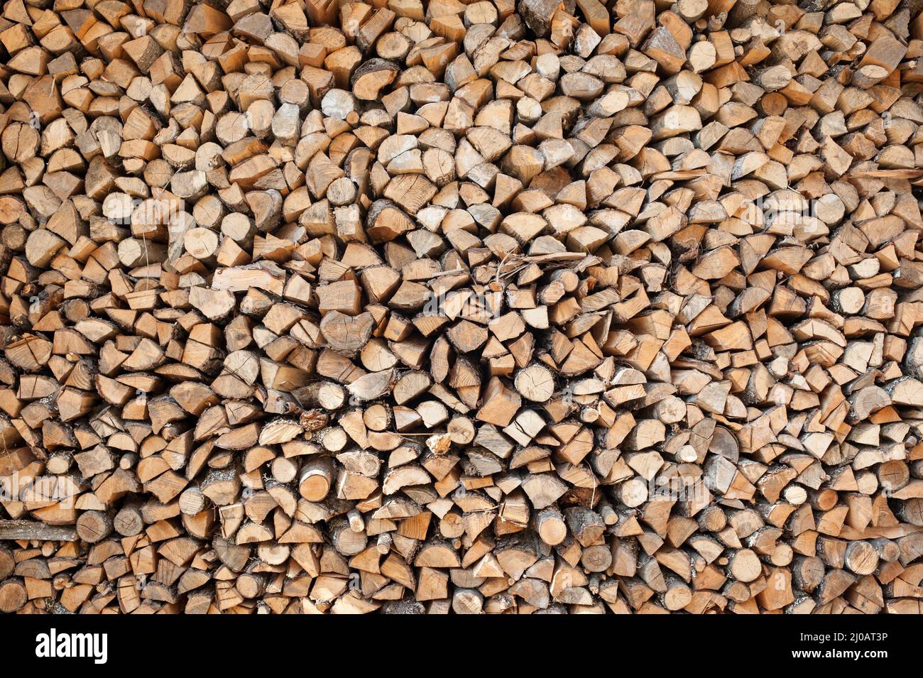 stack of fire wood. Wood stack background texture Stock Photo - Alamy