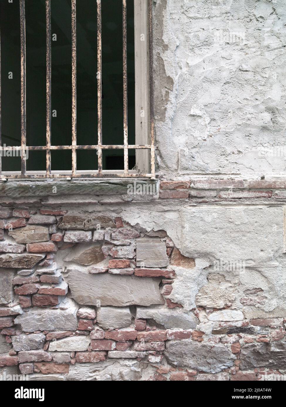 Old brick wall with rusty window Stock Photo - Alamy