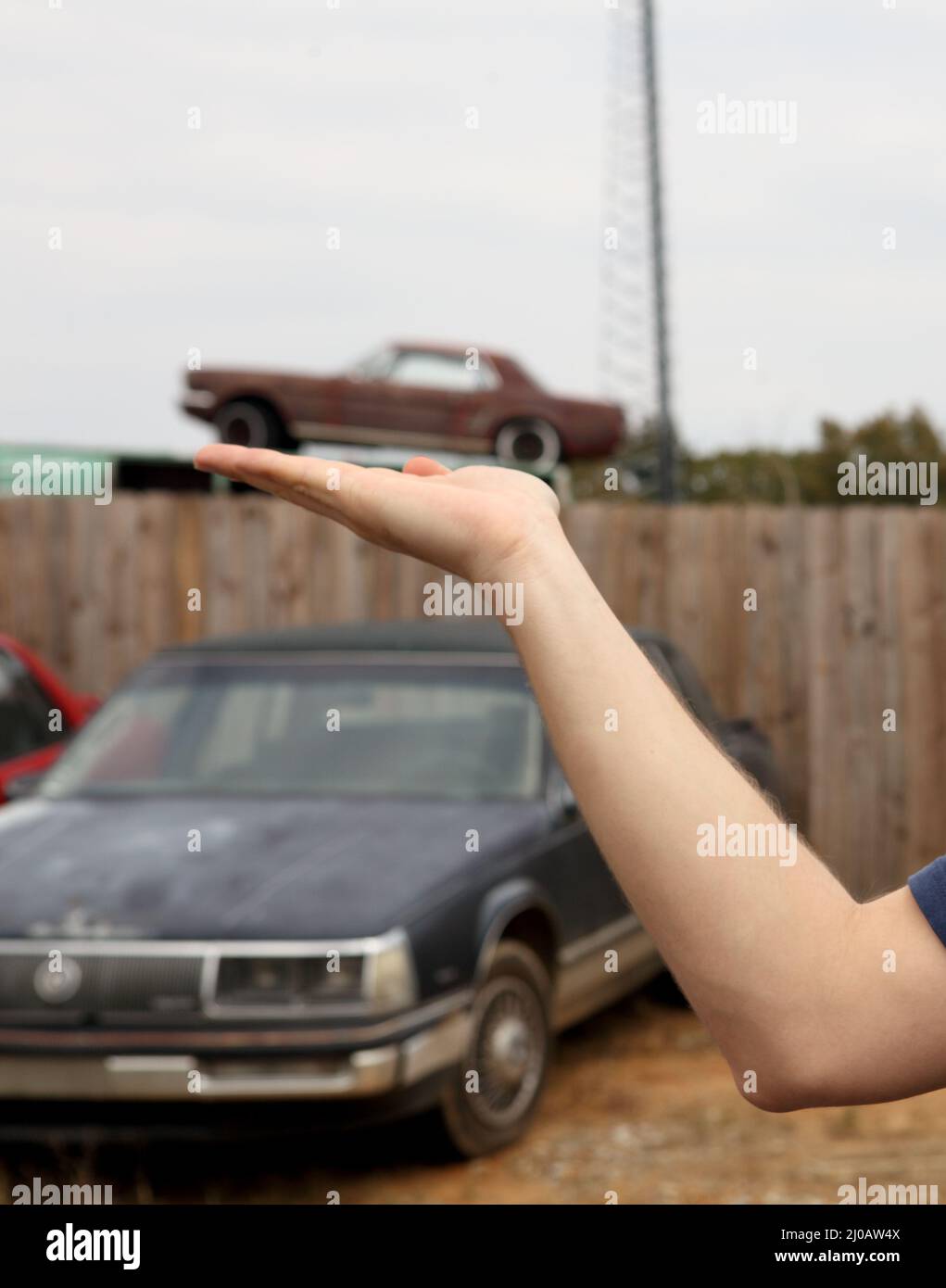 Car on hand Stock Photo - Alamy