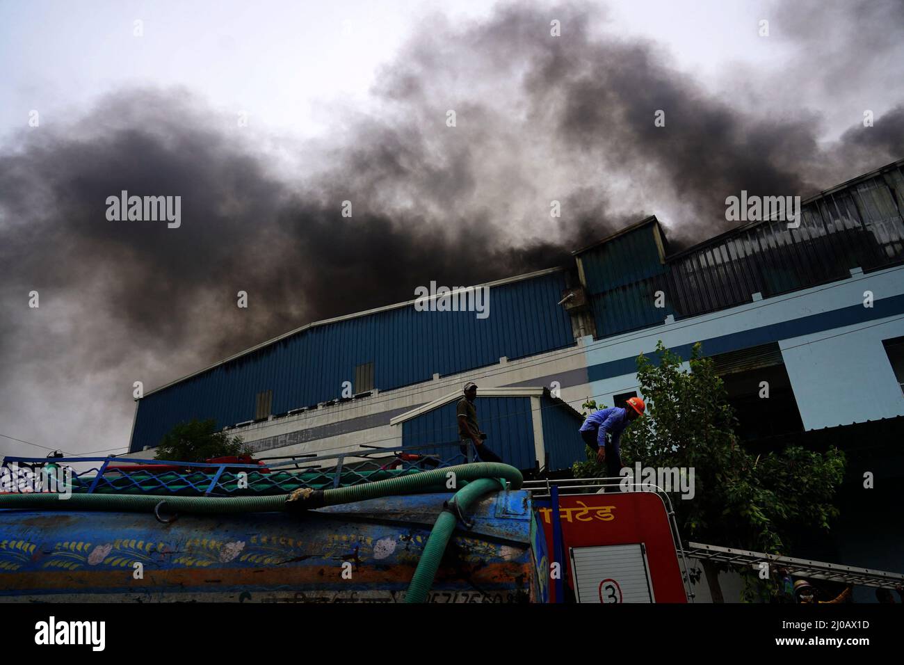 Smoke rises after a fire broke out at a Plastic Factory in Ajmer ...