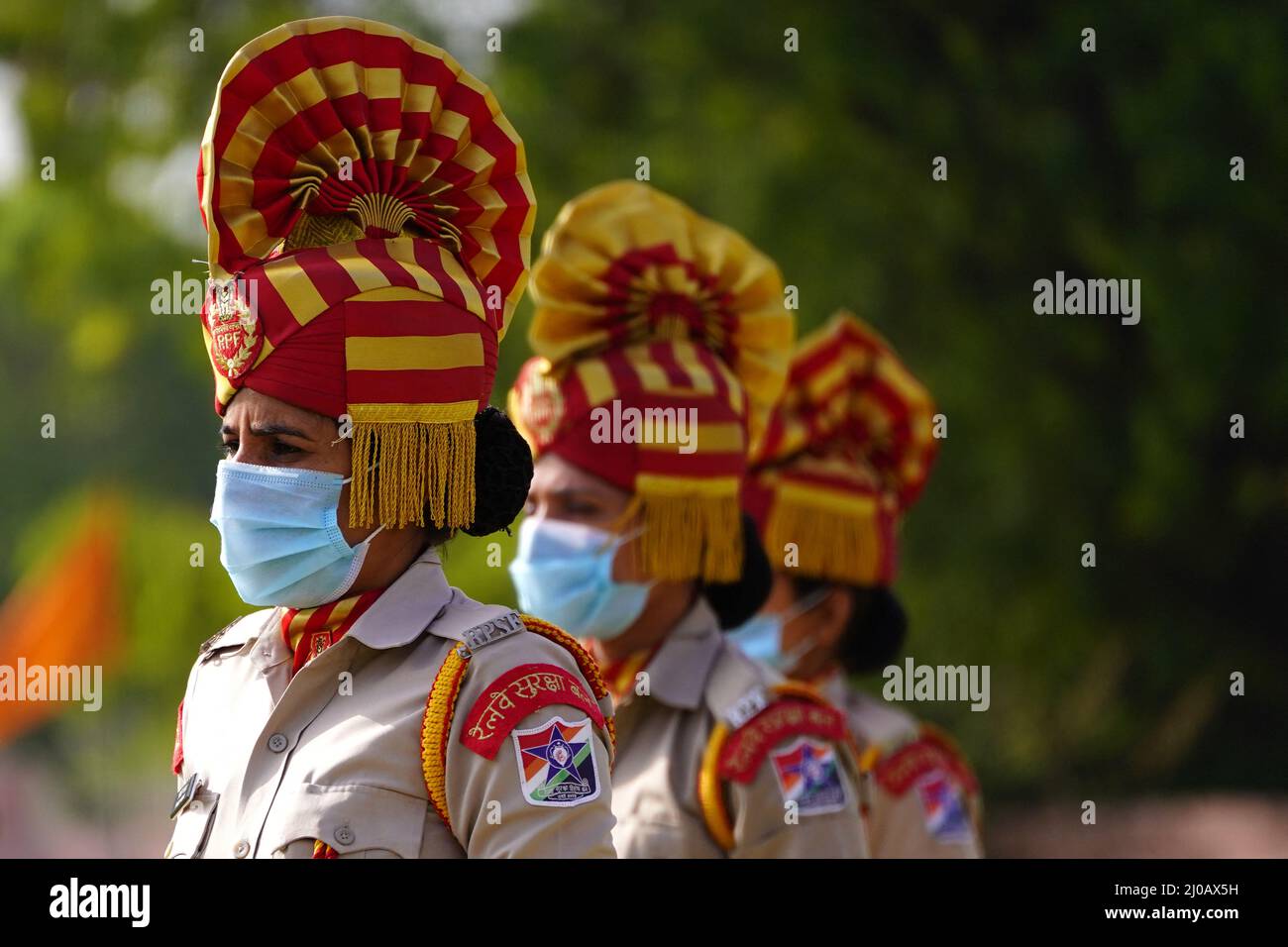 Indian Railway Protection Force (RPF) personnel wearing face masks ...