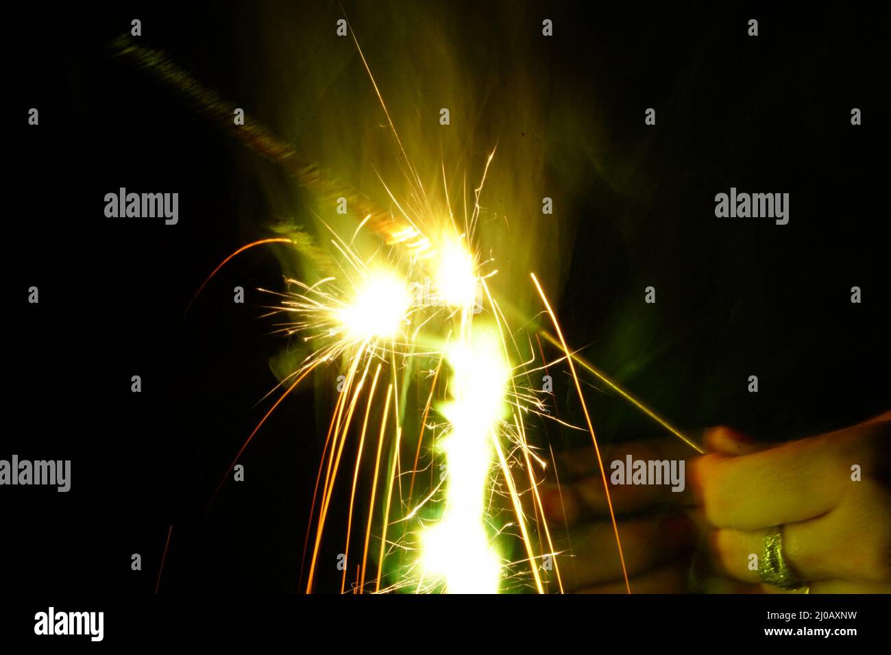Indian people light firecrackers hi-res stock photography and images ...