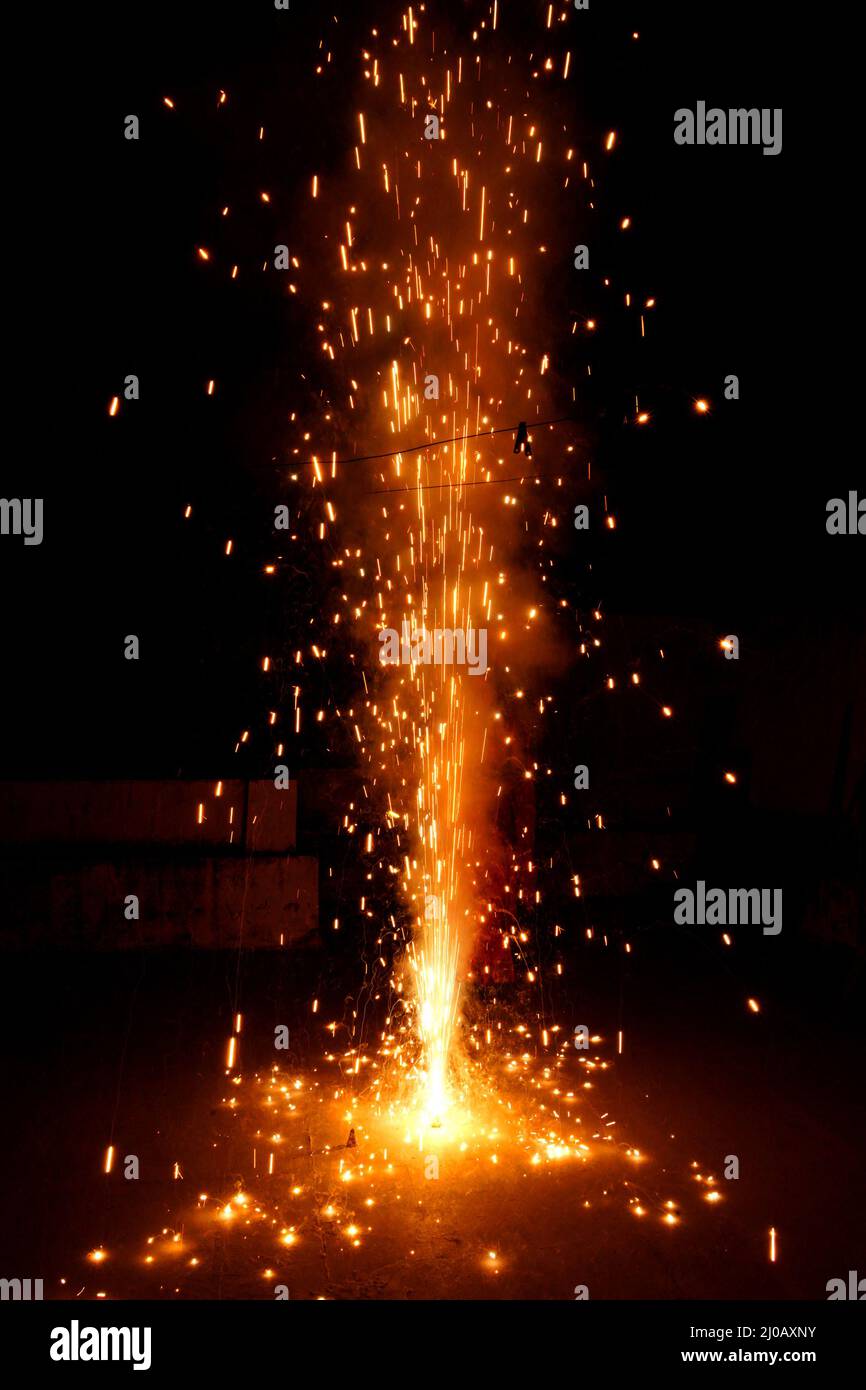 Indian people light firecrackers hi-res stock photography and images ...