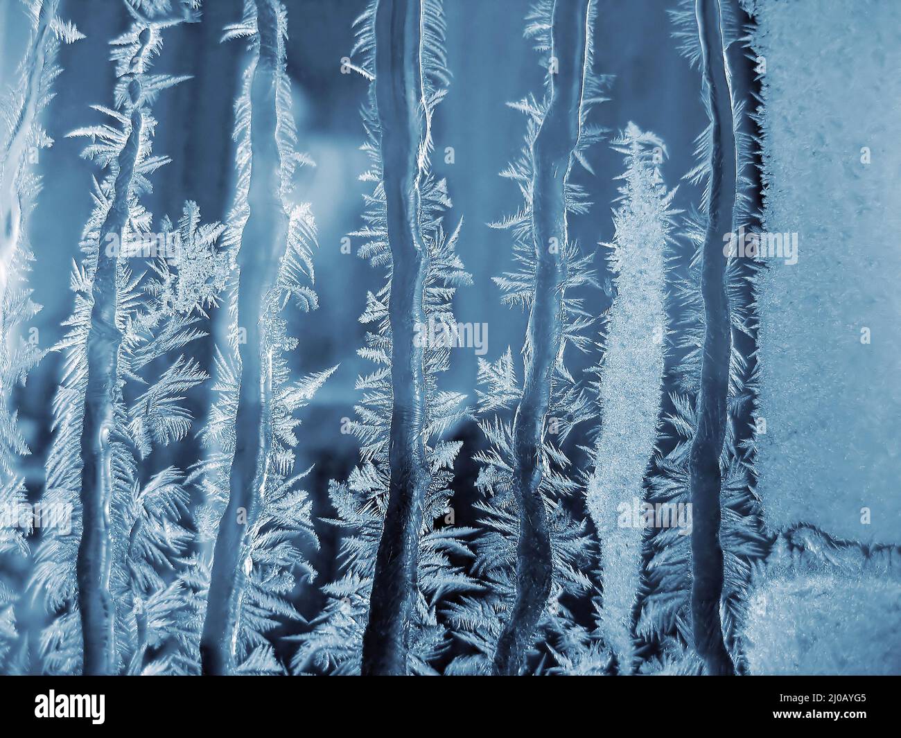 Ice pattern on winter window Stock Photo - Alamy