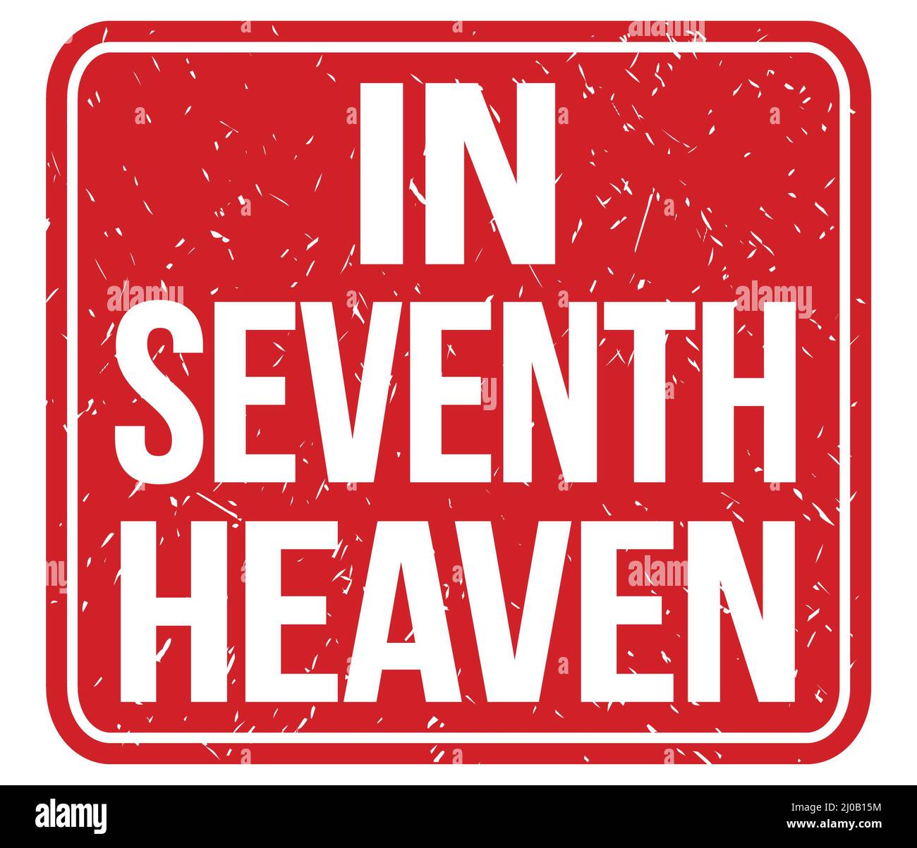 IN SEVENTH HEAVEN, text written on red vintage stamp sign Stock Photo ...