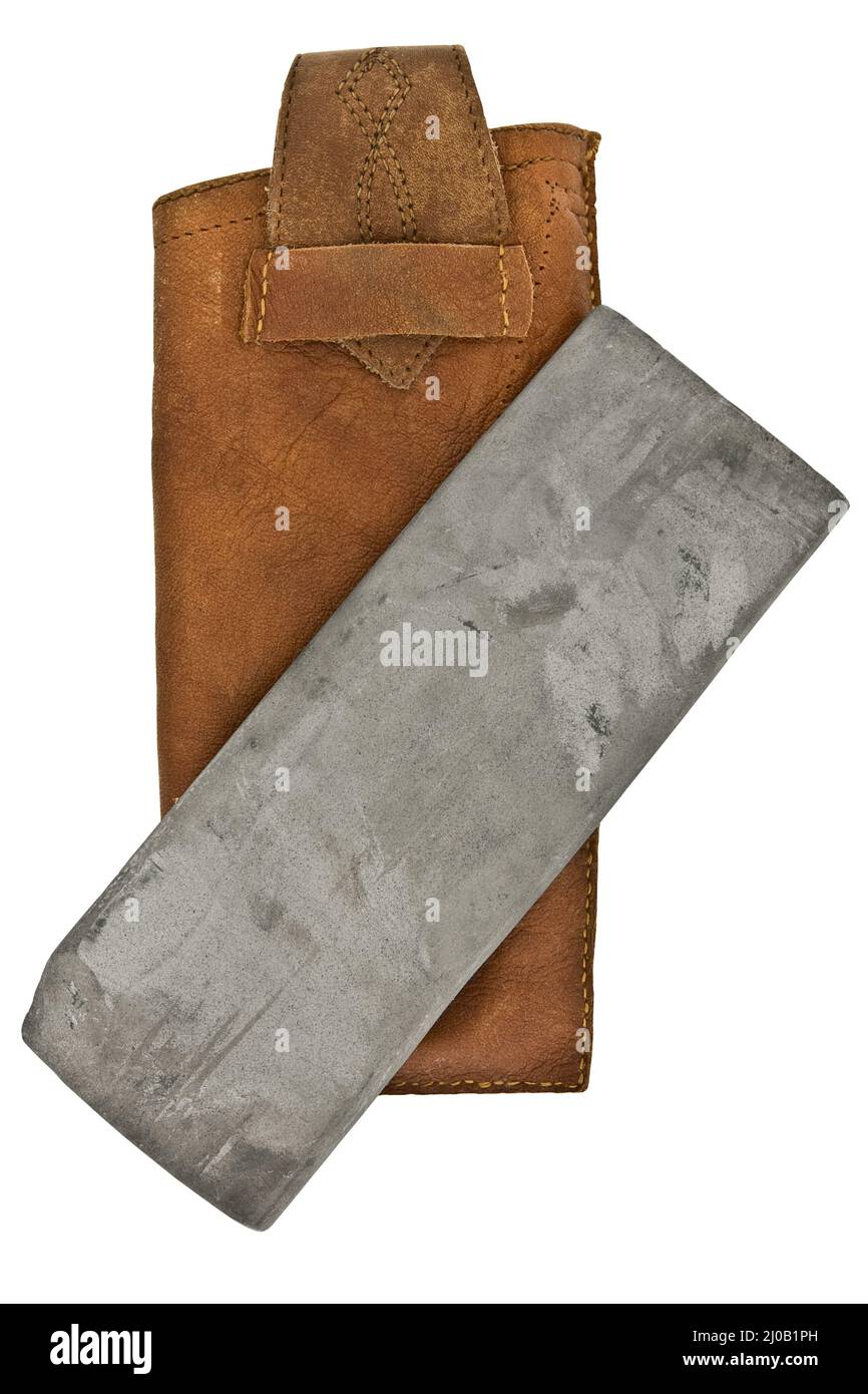 Vintage sharpening stone Stock Photo - Alamy