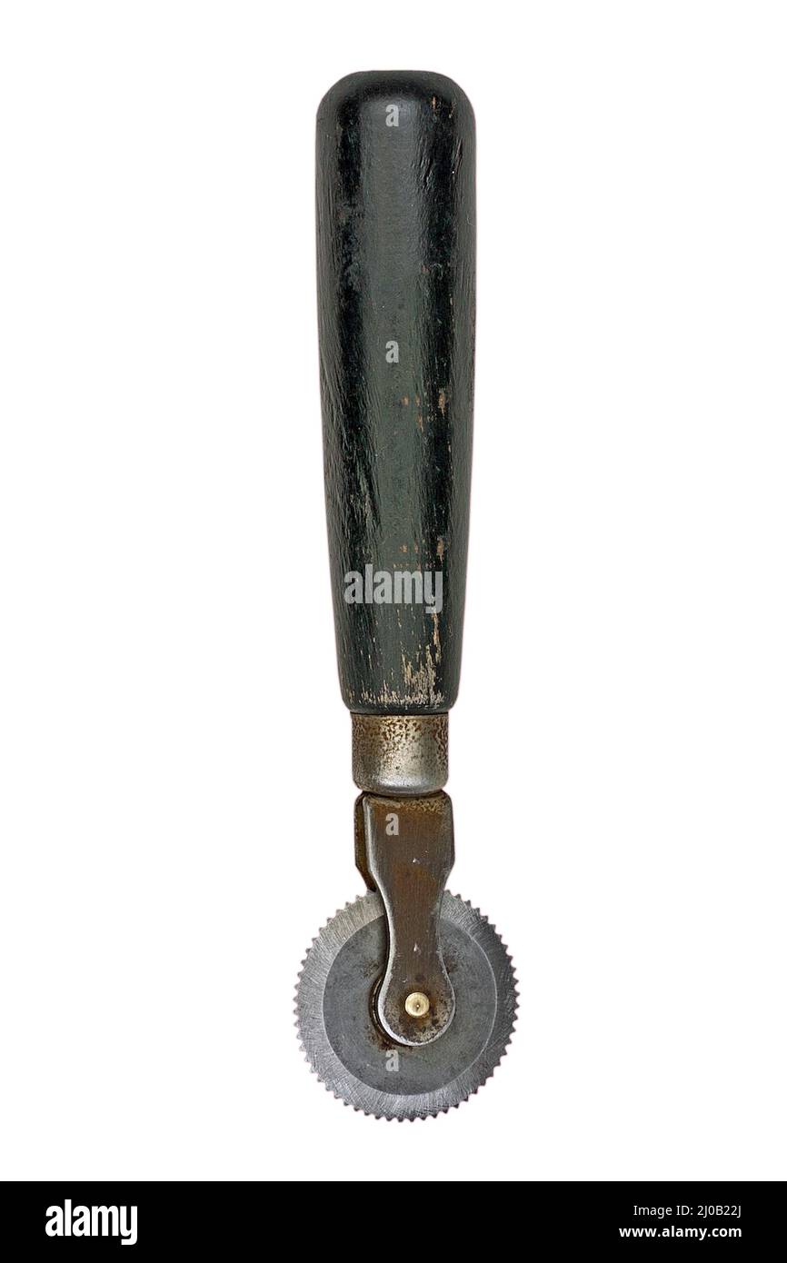 Vintage pastry roller cutter Stock Photo - Alamy