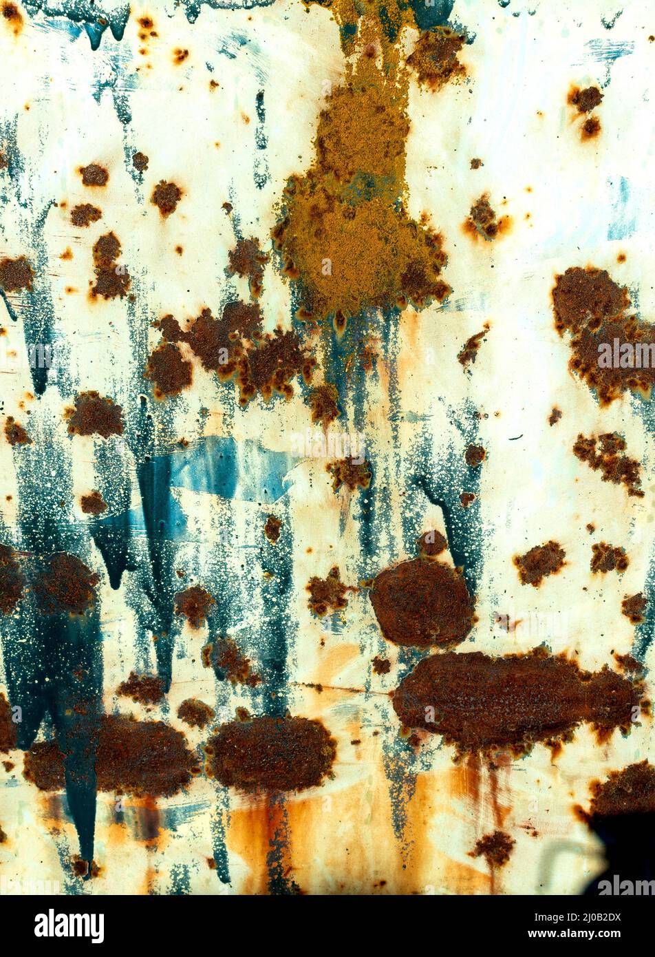 Abstract textures of rust and blue patterns on metal surface captured ...