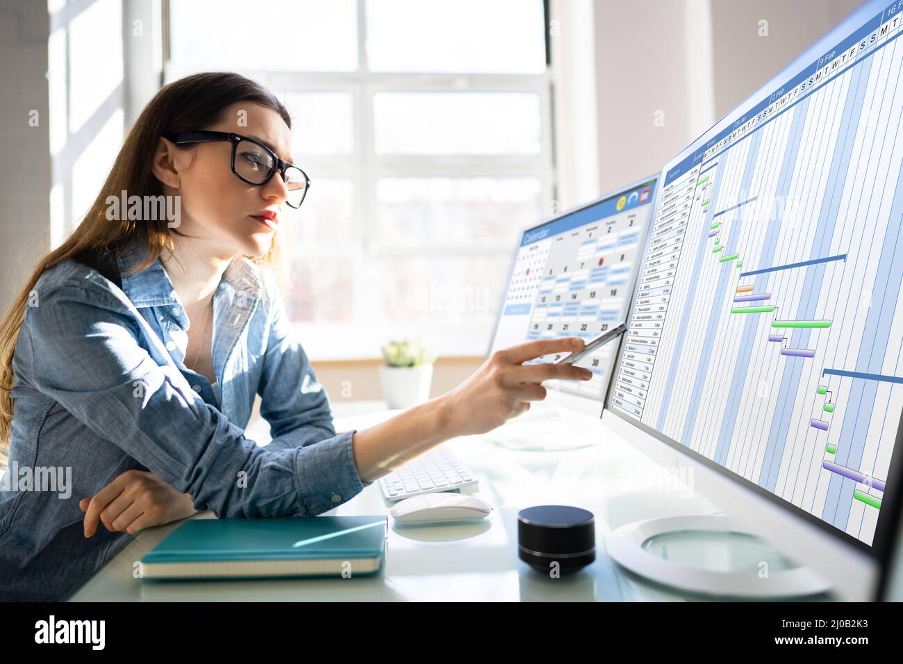 Business Woman Using Calendar Agenda Schedule On Computer Screen Stock ...