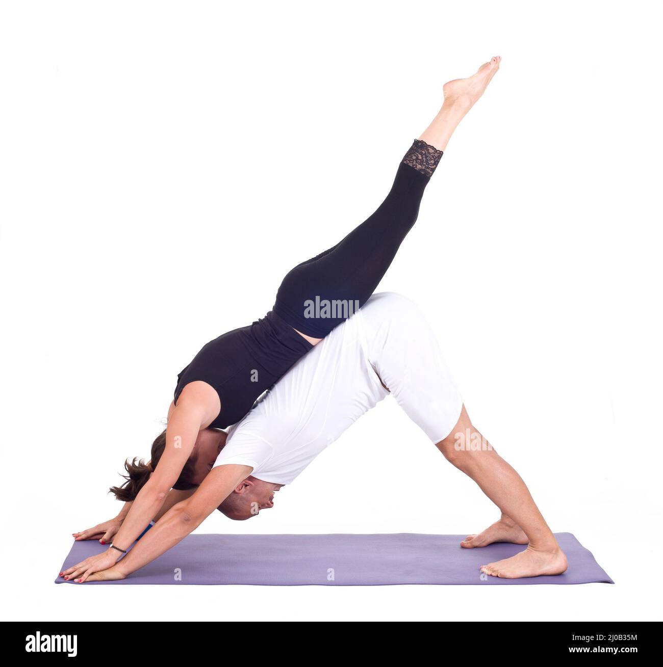 Acro Yoga / Down Dog Pose - Adho Mukha Svanasana Stock Photo - Alamy