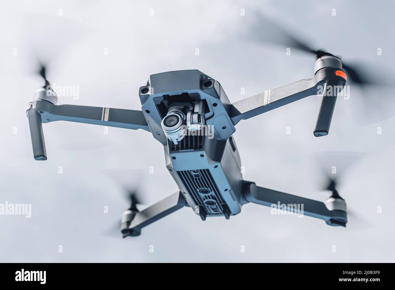 Uav drone copter flying with high resolution digital camera. Close up ...