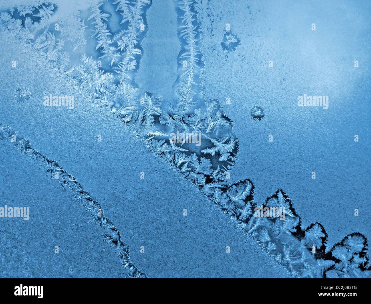 Natural ice pattern on glass Stock Photo - Alamy