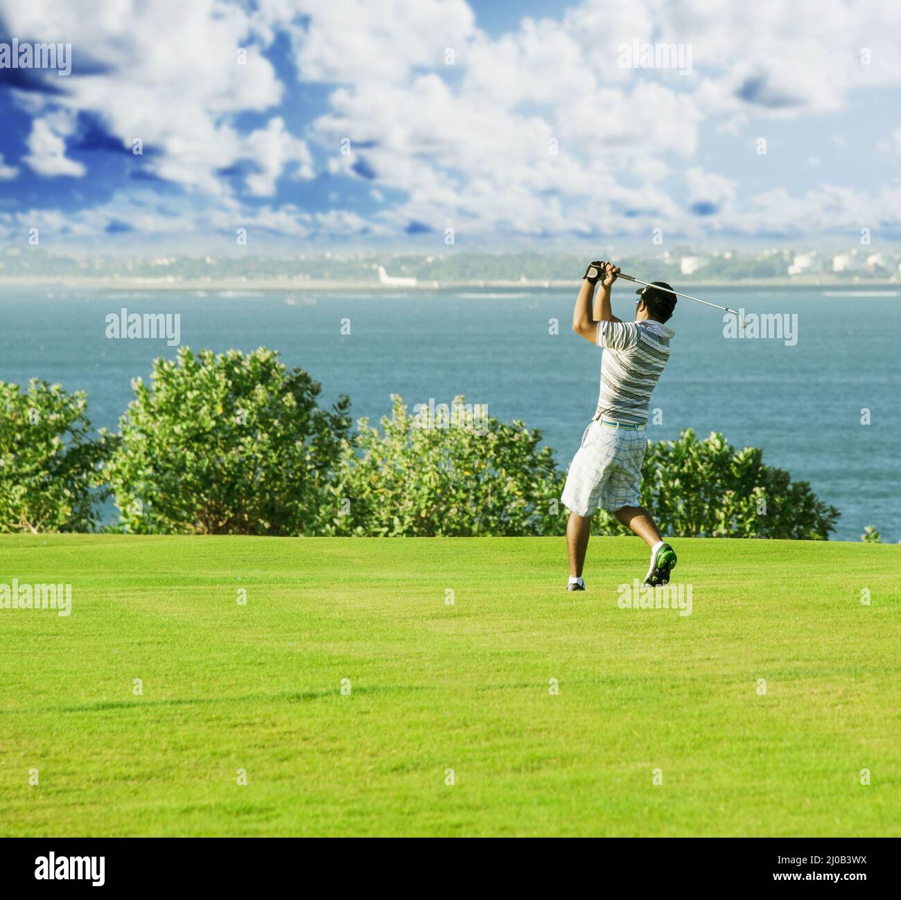 Golf club. Man playing golf Stock Photo - Alamy
