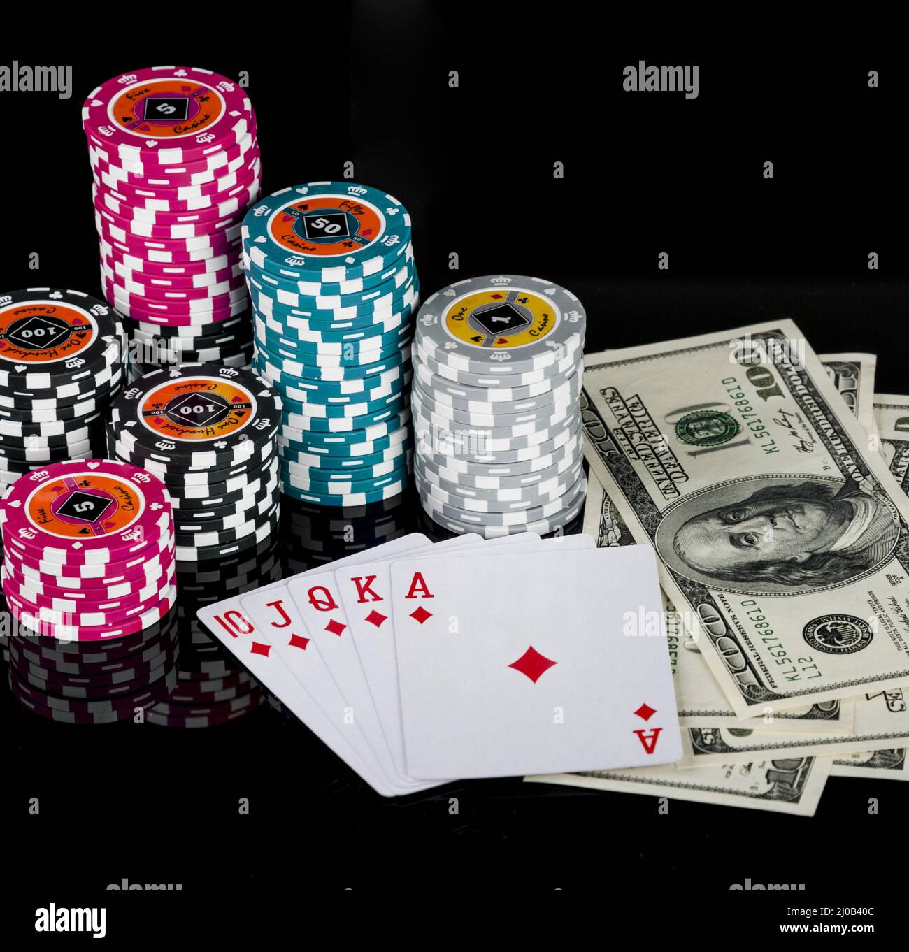 Poker cards dollars hi-res stock photography and images - Alamy