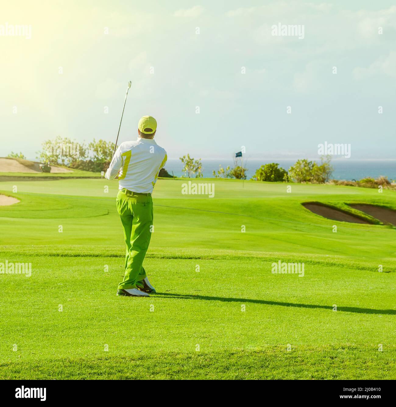 Golf club. Man playing golf Stock Photo - Alamy