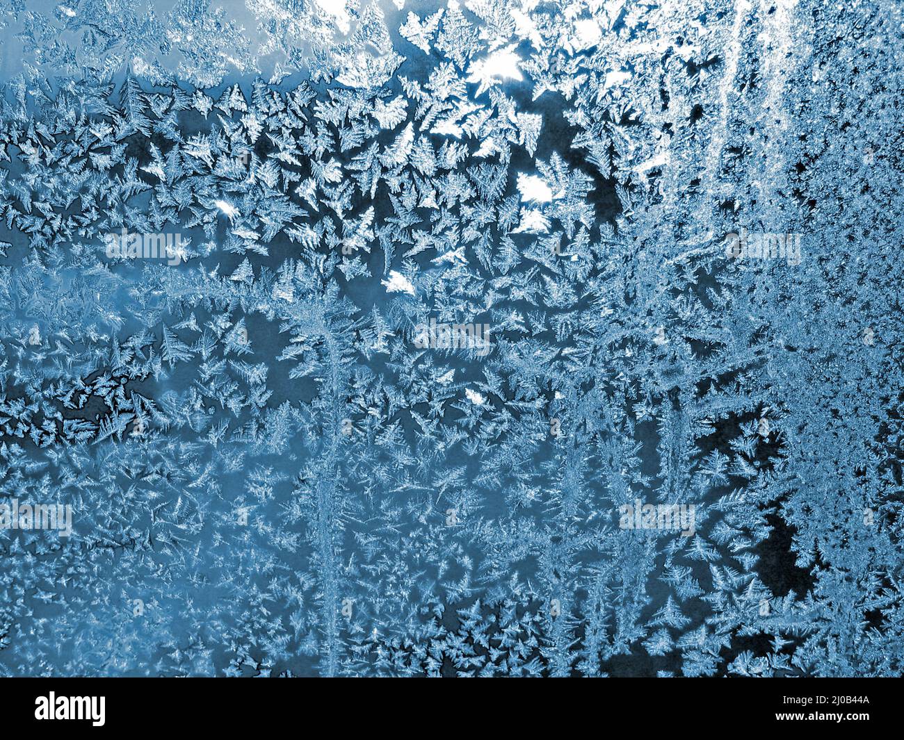 Ice pattern on winter glass Stock Photo - Alamy