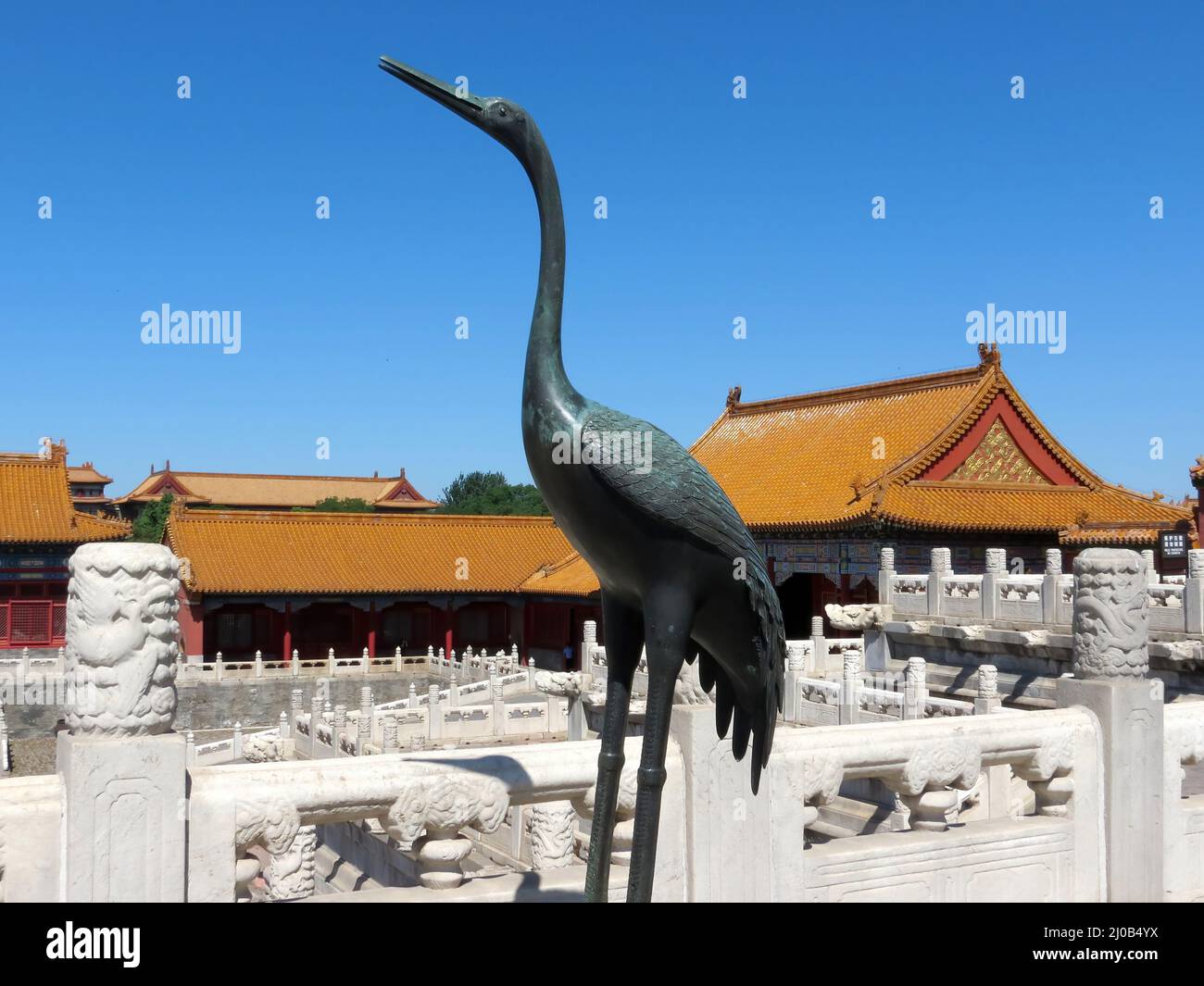 Bronze Heron statue in The Forbidden city in Beijing, China Stock Photo ...