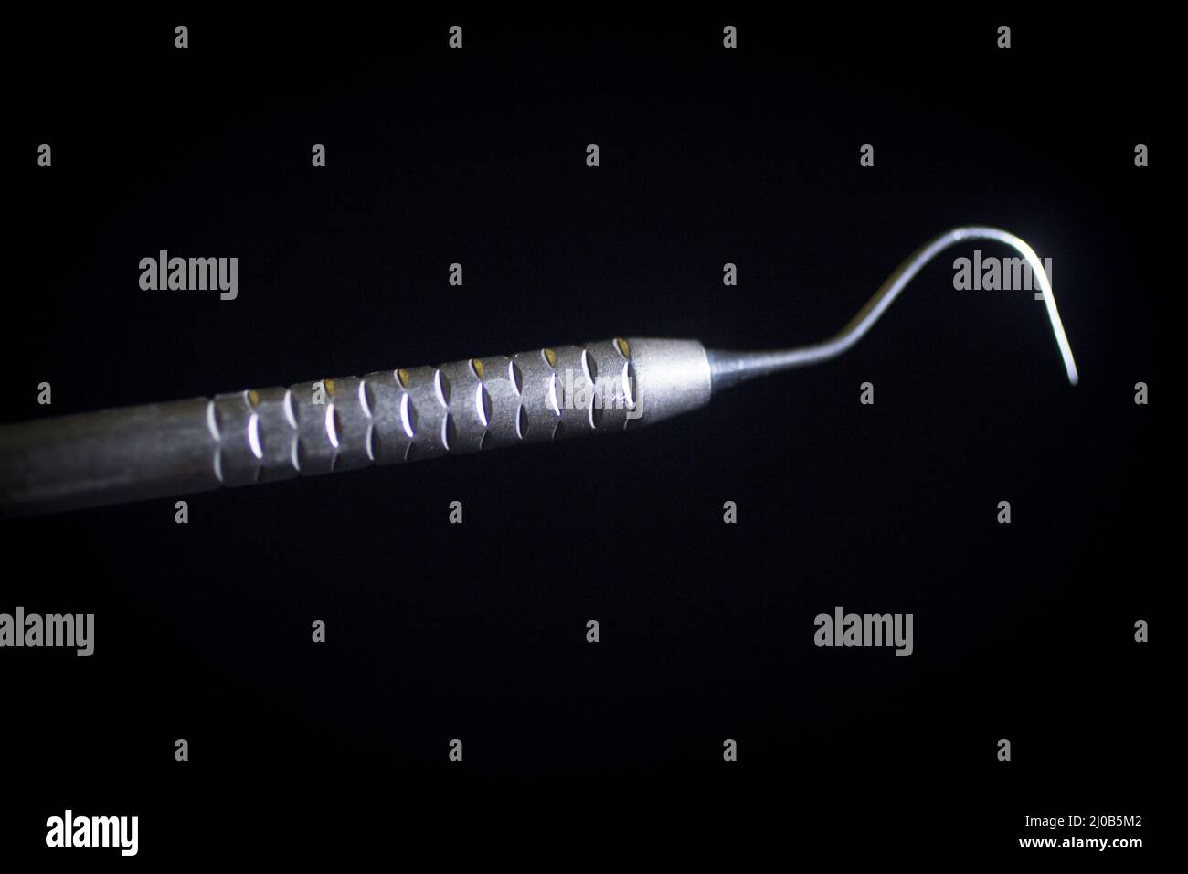 Dentists instrumentation dental tooth pick Stock Photo - Alamy
