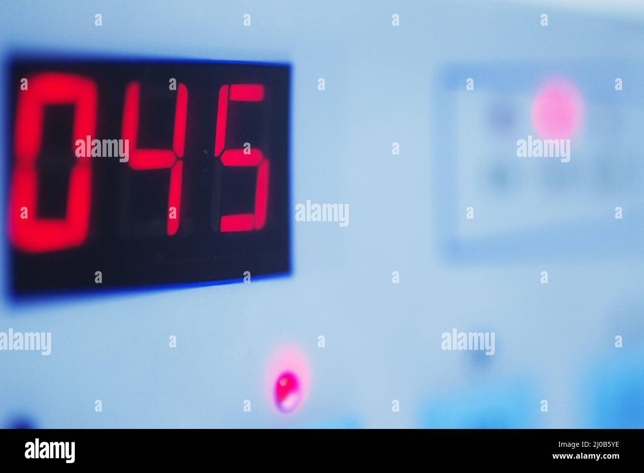 Medical laboratory machine digital readout showing numbers 045 Stock ...