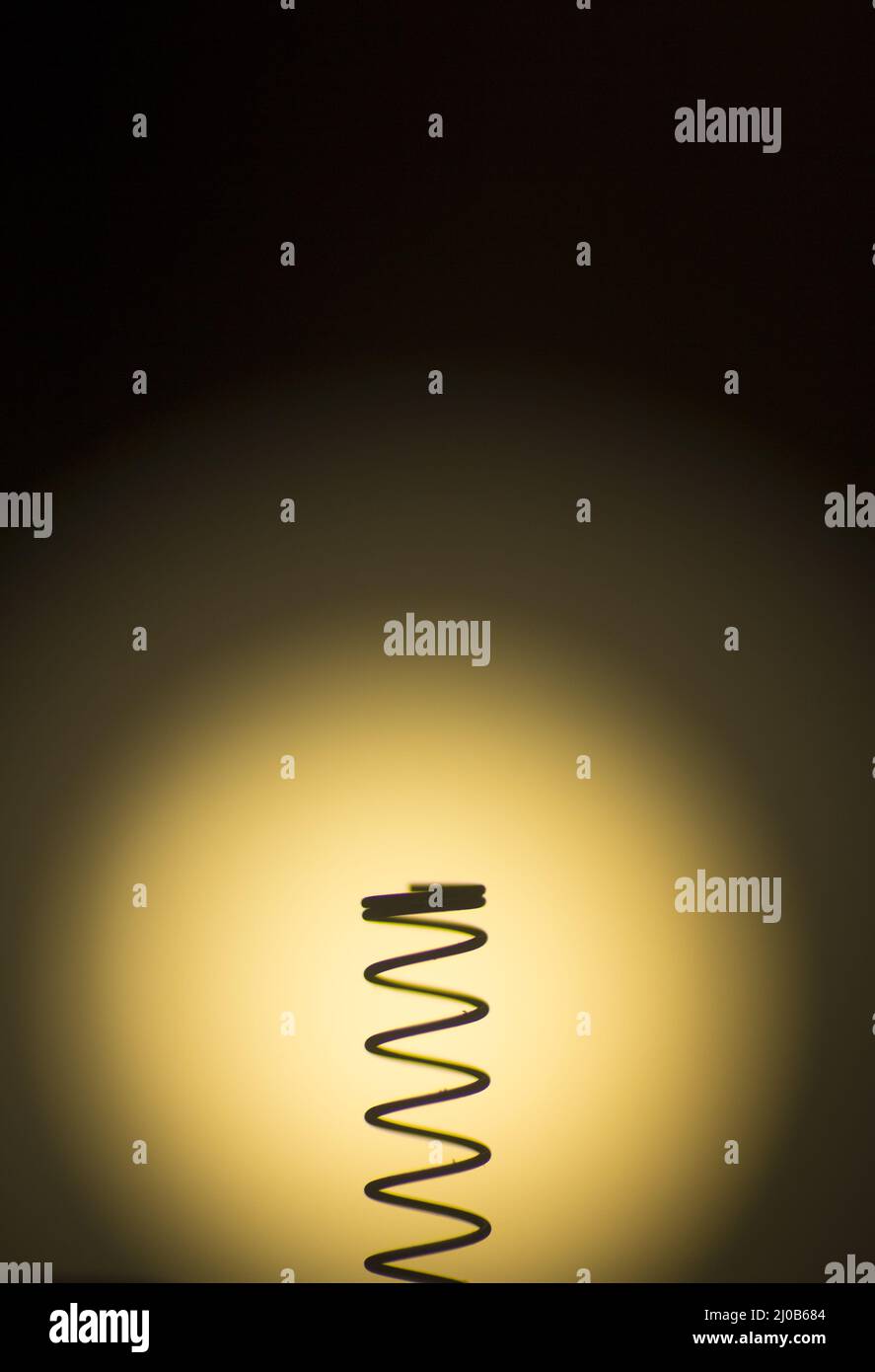 Metal spiral spring Stock Photo - Alamy