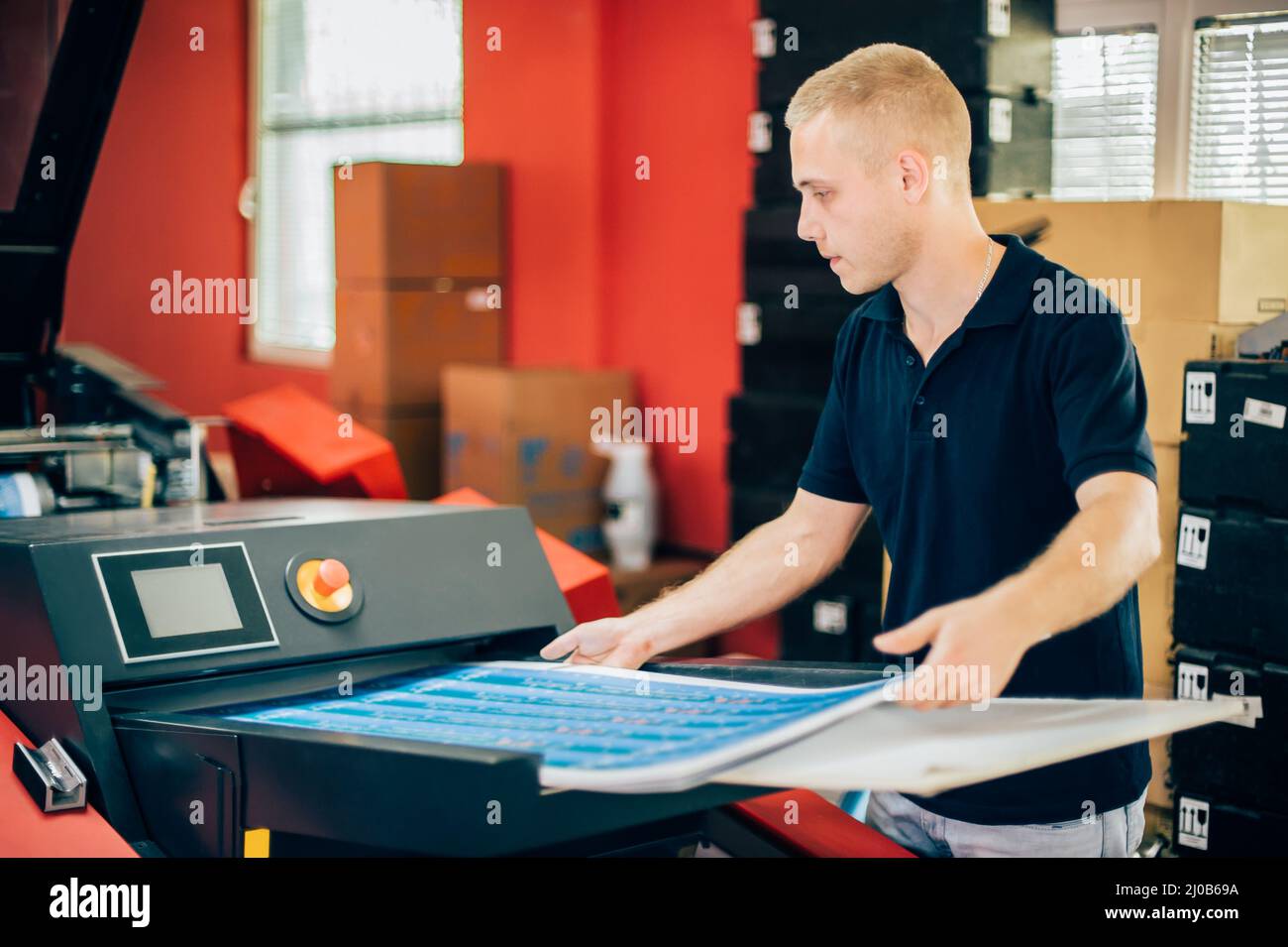 Young man screen printing hi-res stock photography and images - Alamy