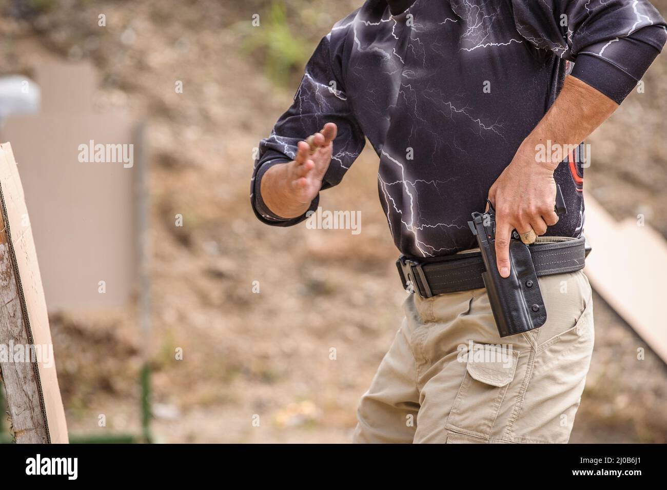Pulling Gun Training. Outdoor Shooting Range Stock Photo - Alamy