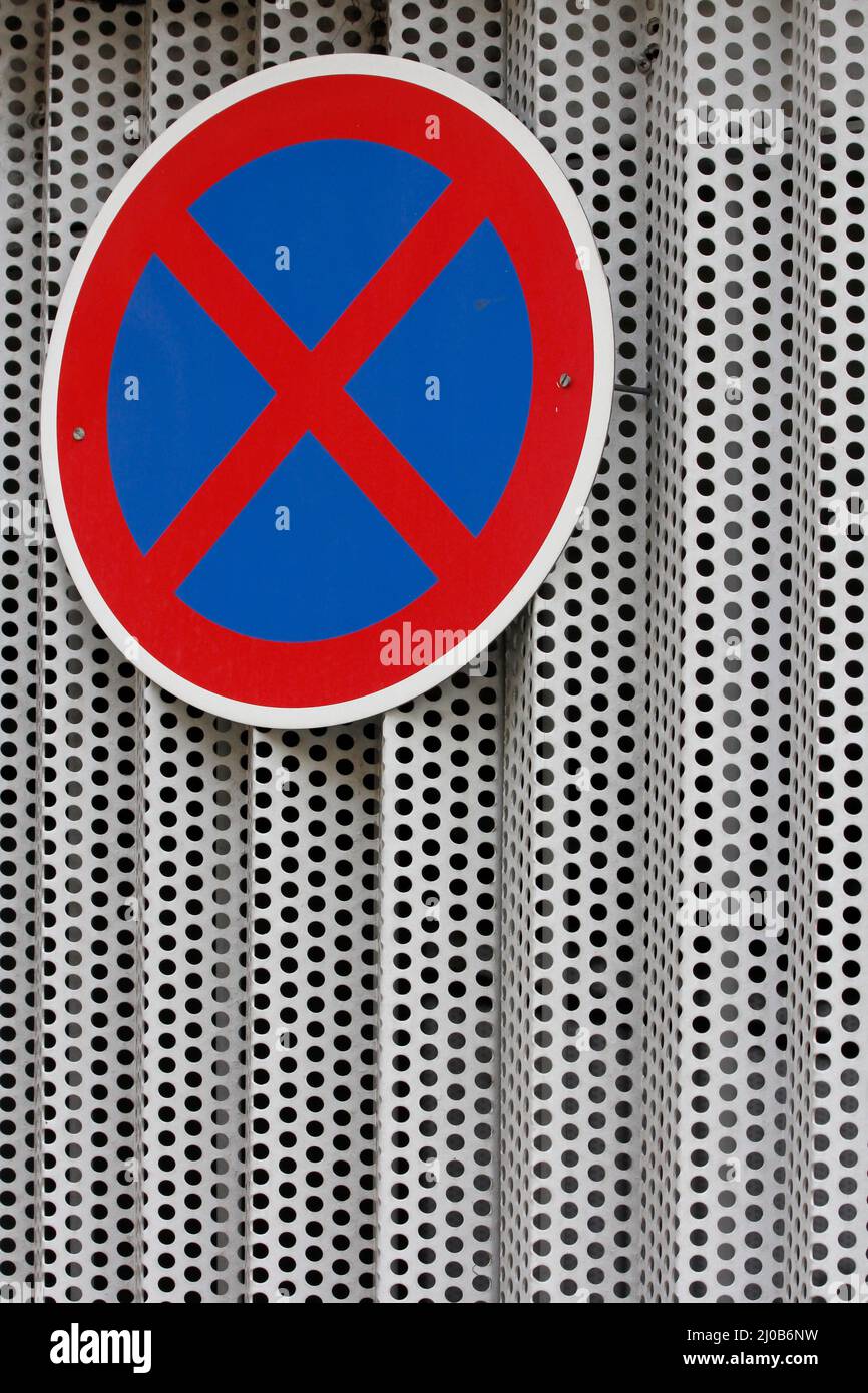 bright road traffic sign for no stopping in red and white concentric ...