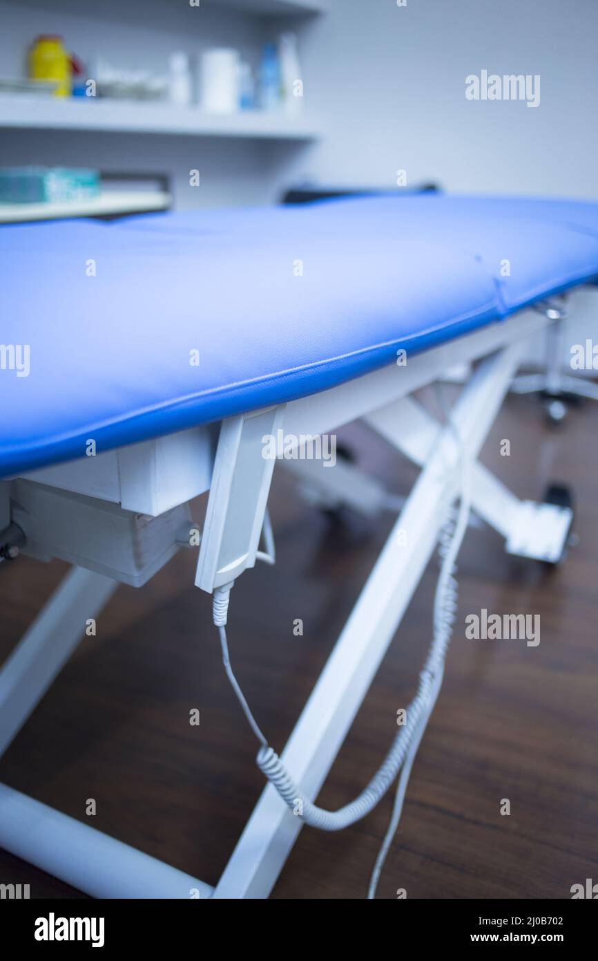 Physiotherapy bed in medical clinic Stock Photo - Alamy