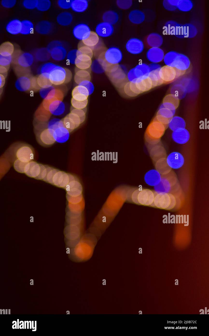 Christmas star neon light shape Stock Photo - Alamy