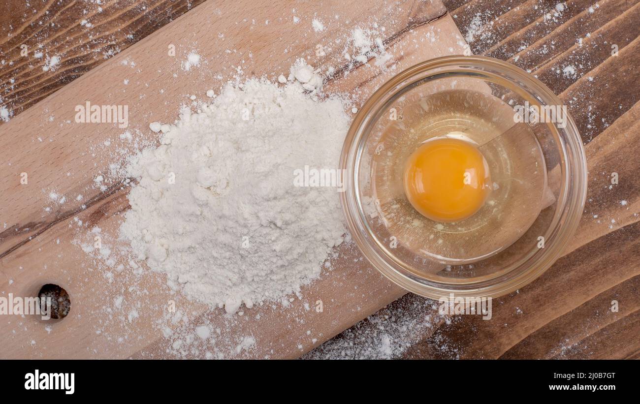 Dough recipe ingredients on vintage rural wood kitchen table. Biscuits ...