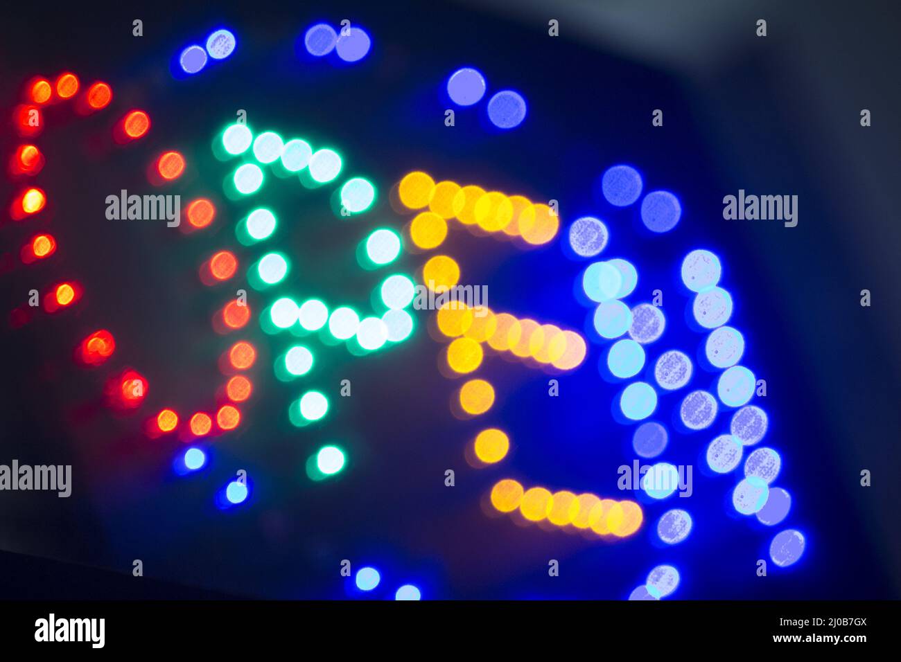 Neon open sign at night Stock Photo - Alamy