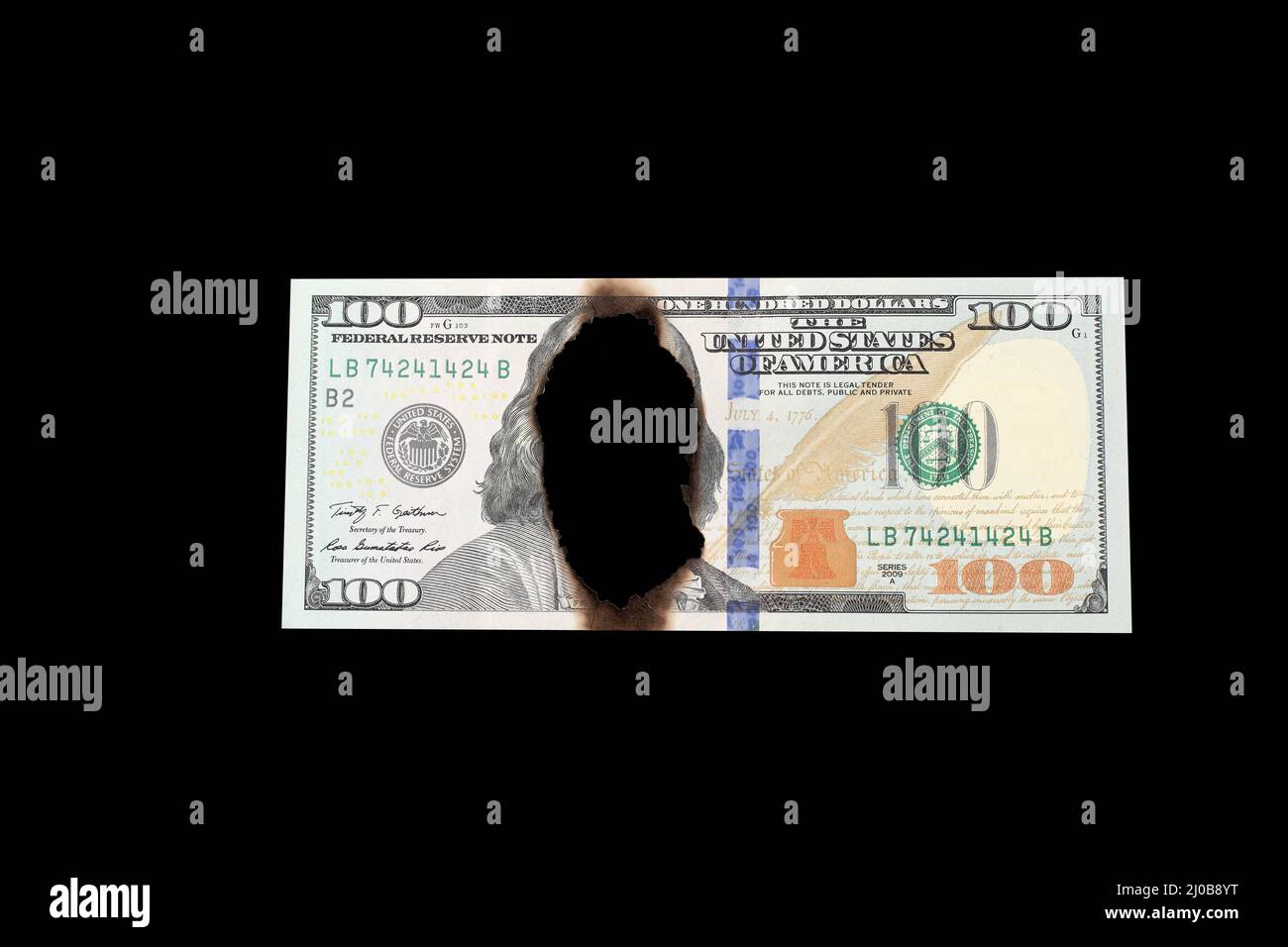 Burning 100 dollar bill hi-res stock photography and images - Alamy