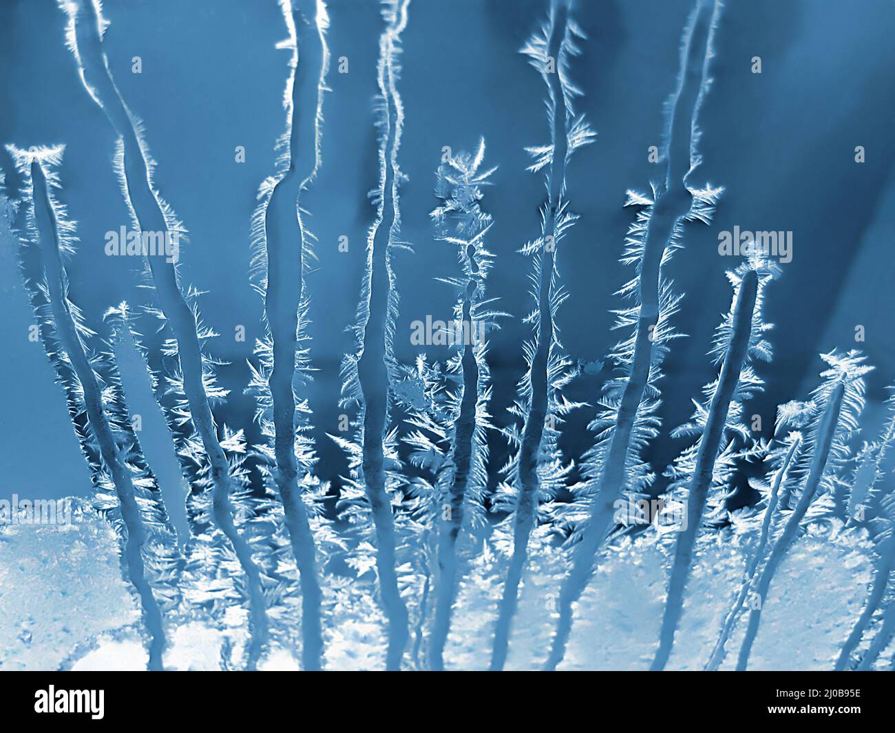 Ice pattern on winter window Stock Photo - Alamy