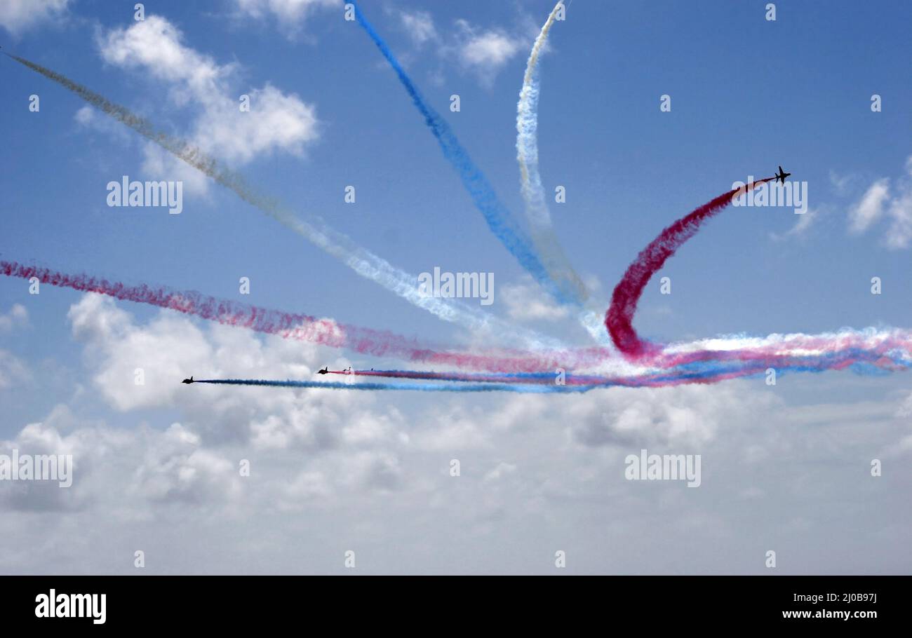 Red Arrows aerobatic display team with smoke trails Stock Photo - Alamy