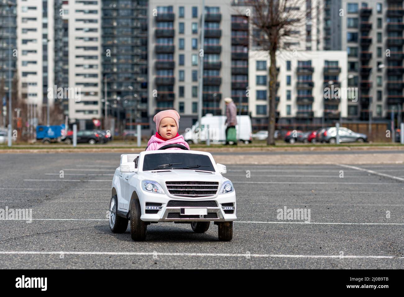 little girldriving a toy car. little driver, childrens car, concept of ...